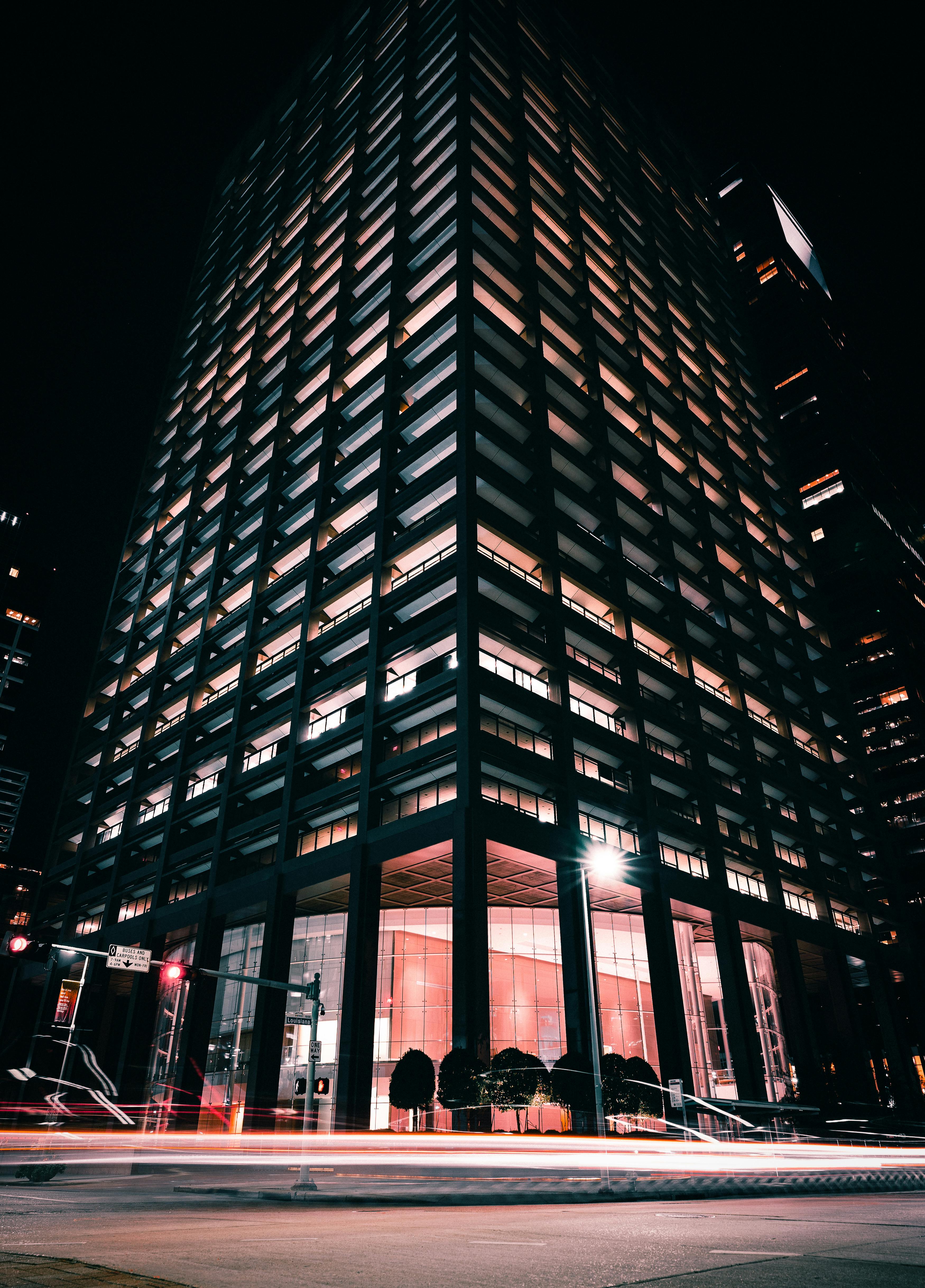 Brown Concrete Building during Night Time · Free Stock Photo
