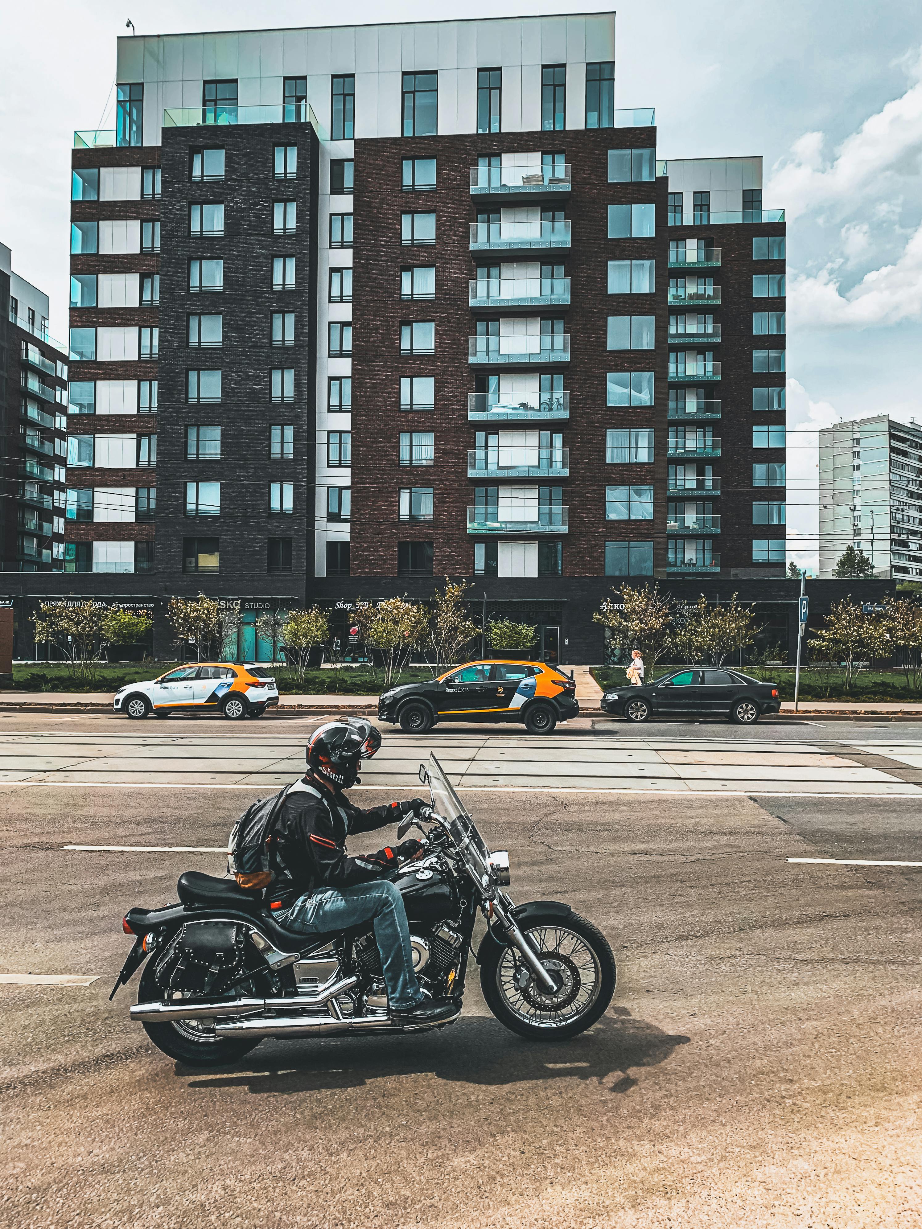 Man Riding Motorbike in Village · Free Stock Photo