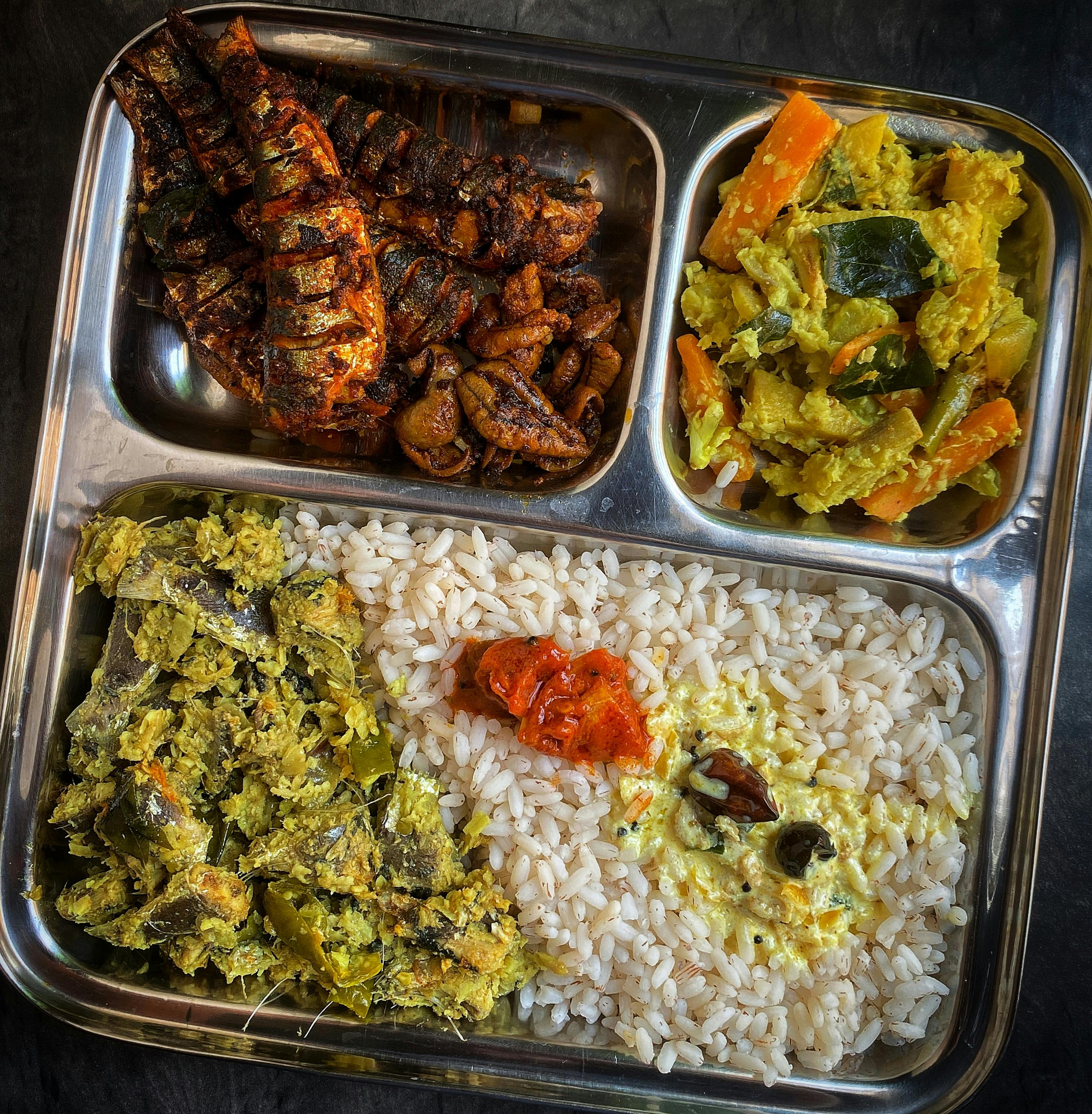 Traditional Food on a Stainless Plate · Free Stock Photo