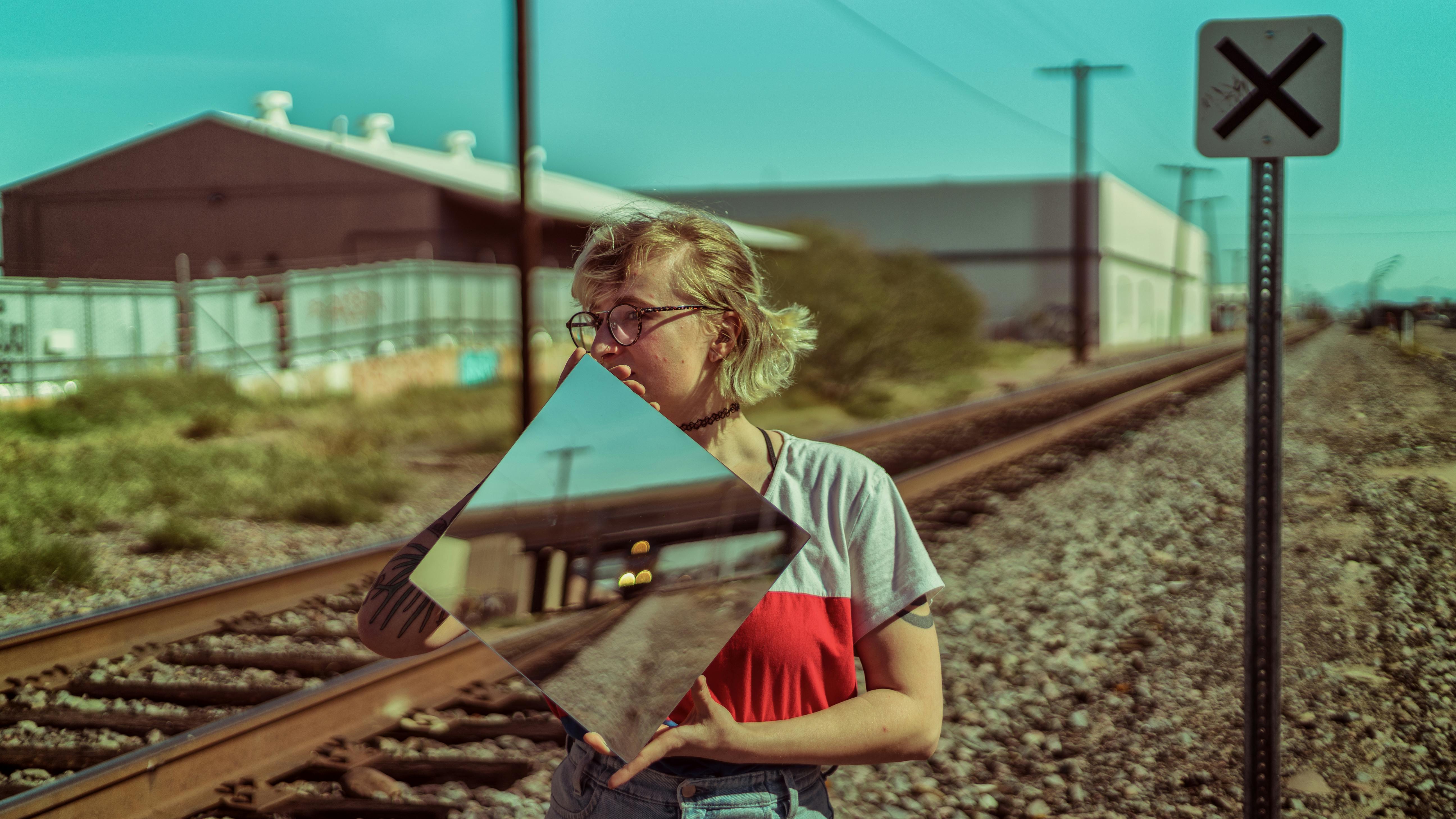 Reflection of Orange Light on a Woman's Body · Free Stock Photo