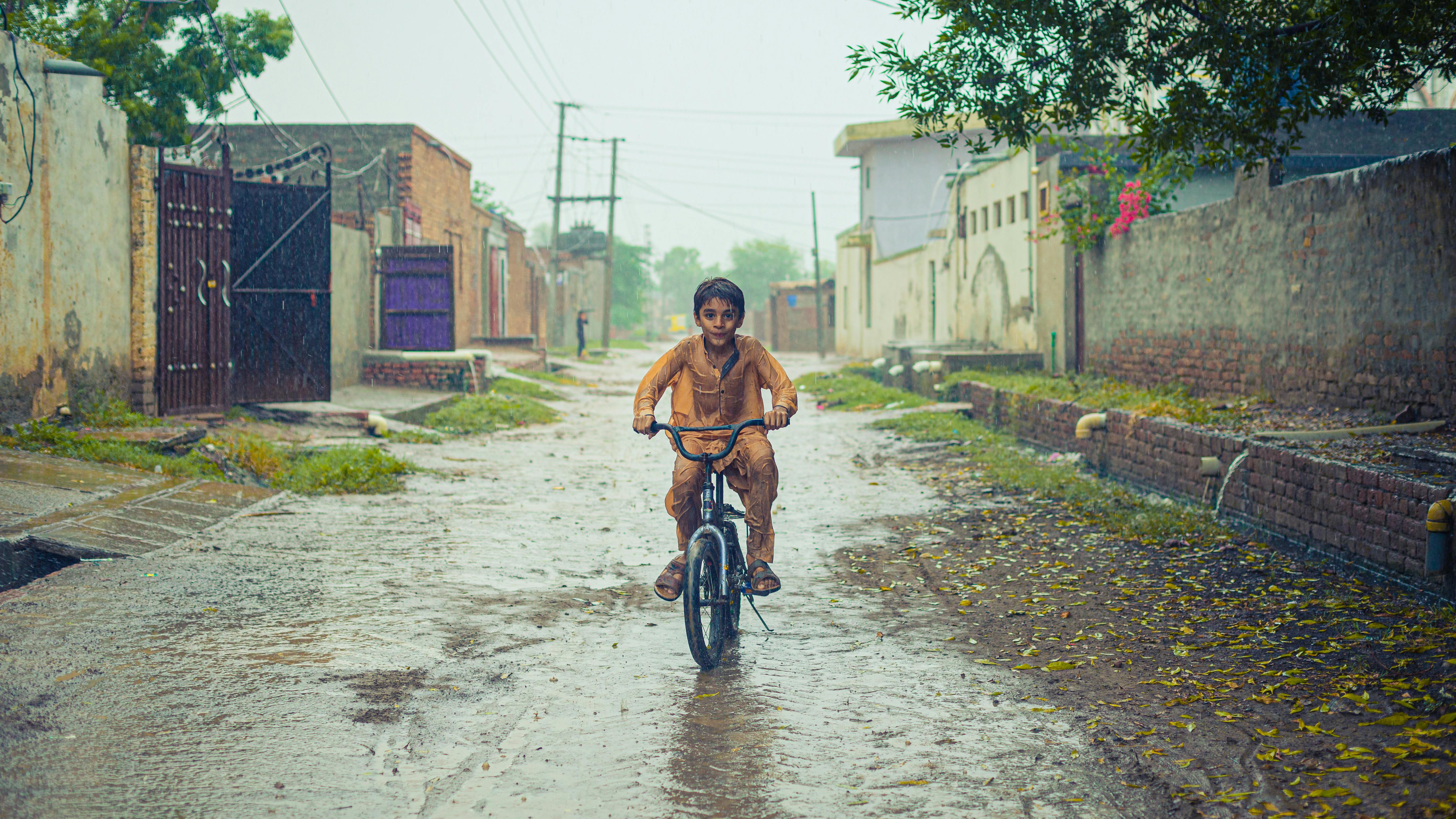 Photo of Boy Riding a Bike · Free Stock Photo