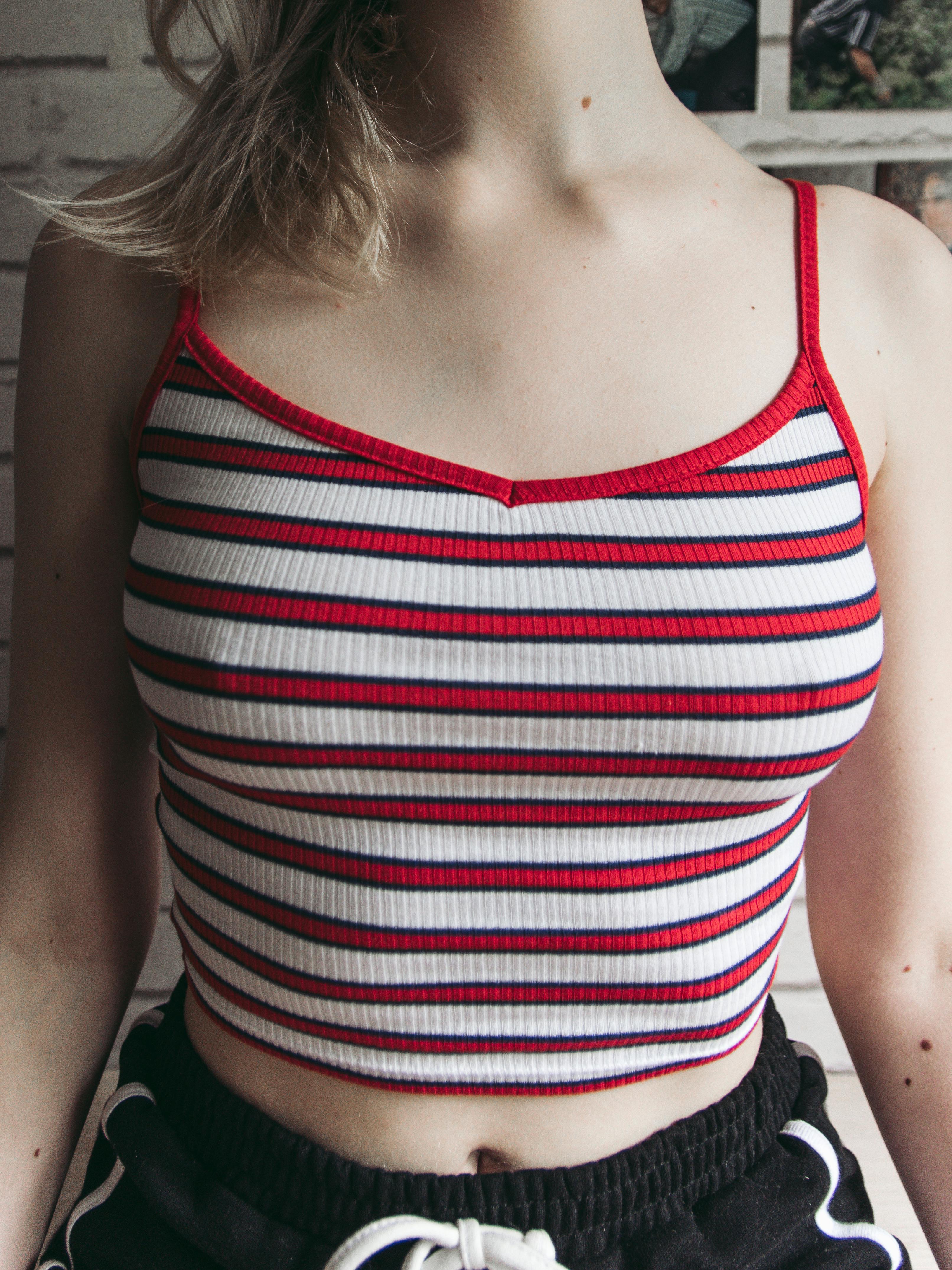 A Woman in White and Red Striped Tank Top · Free Stock Photo