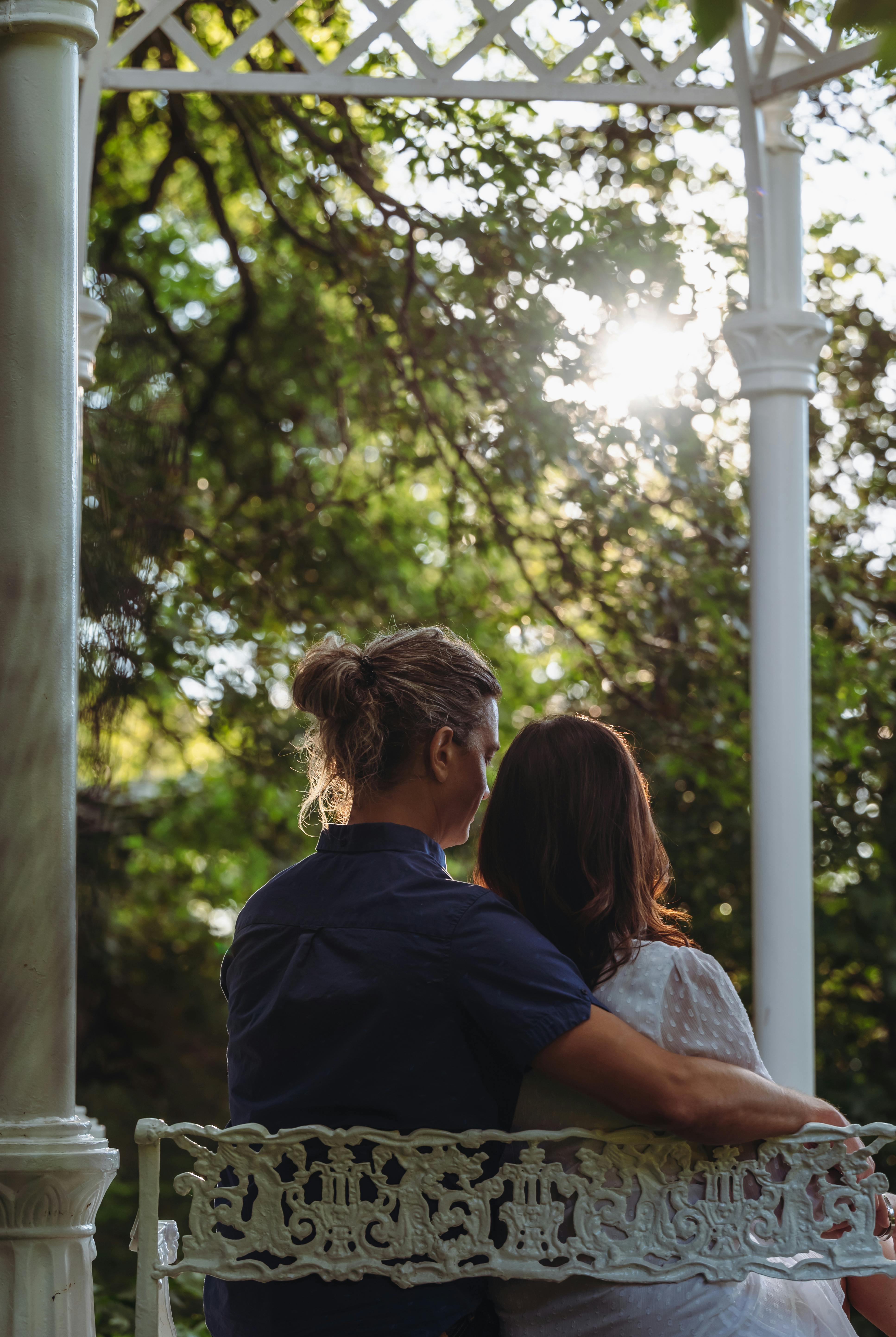A Couple Sitting on the Bench Together · Free Stock Photo