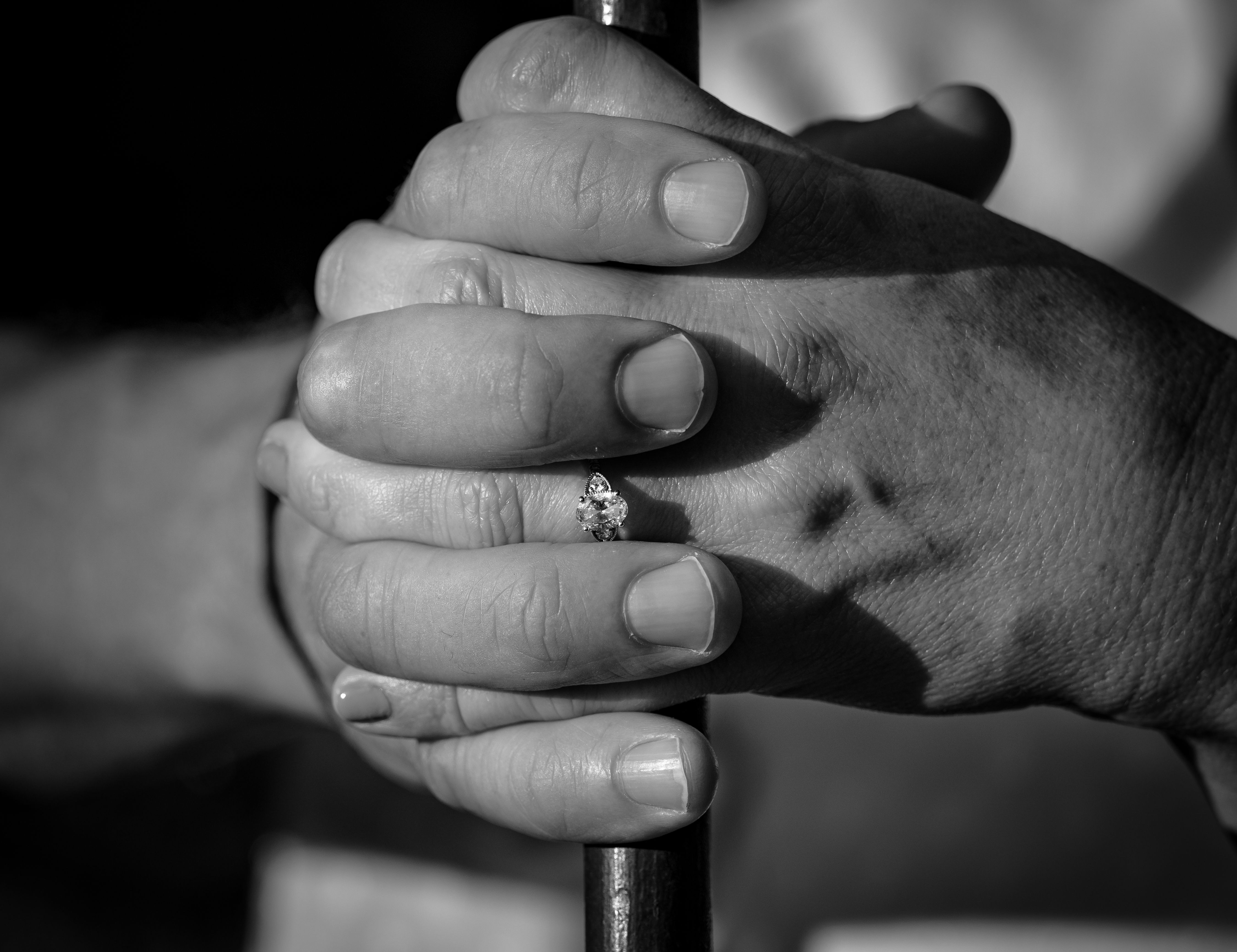 Grayscale Photo of a Person Holding a Pole · Free Stock Photo