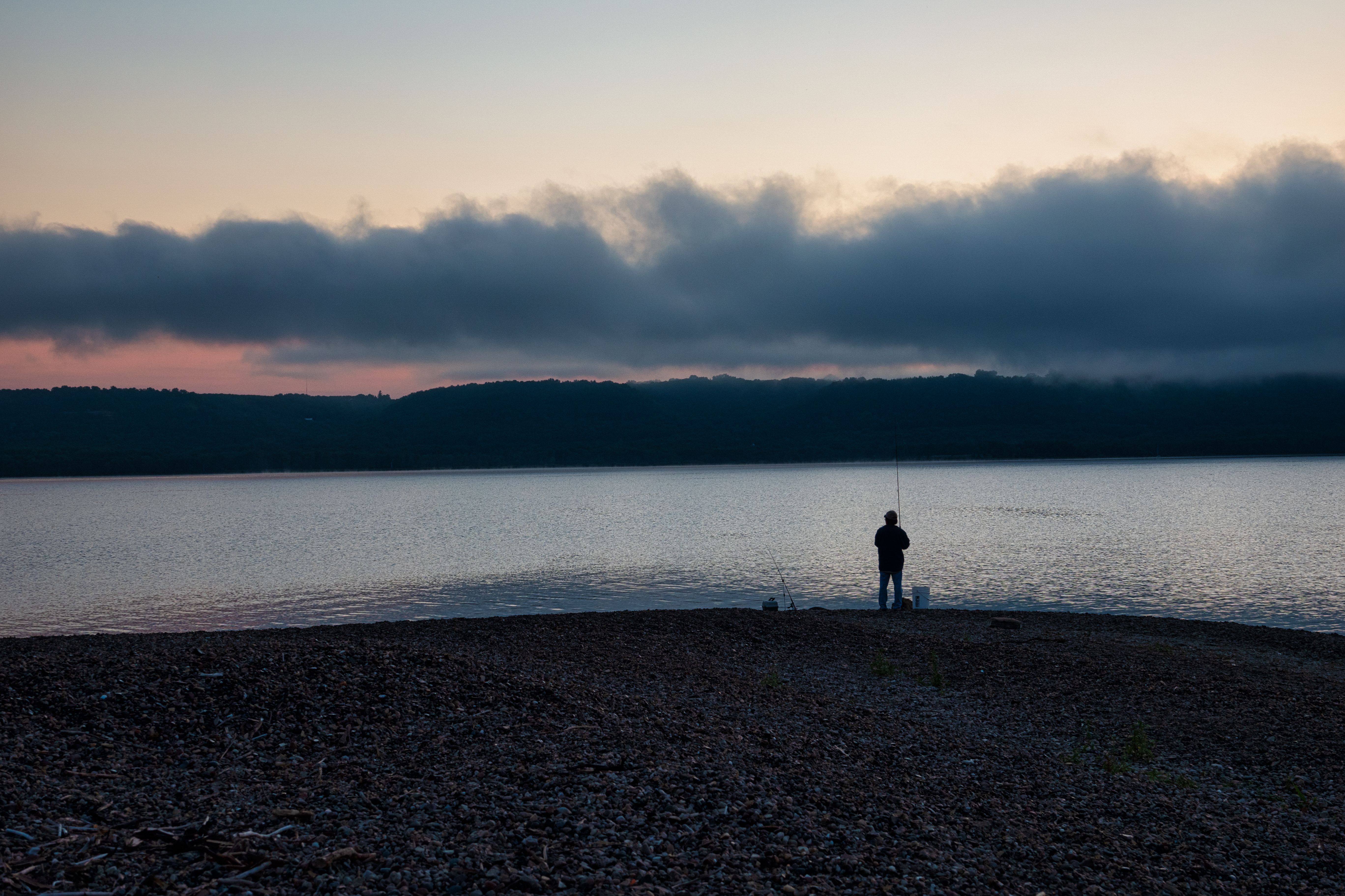 A Man Fishing on the Lake · Free Stock Photo