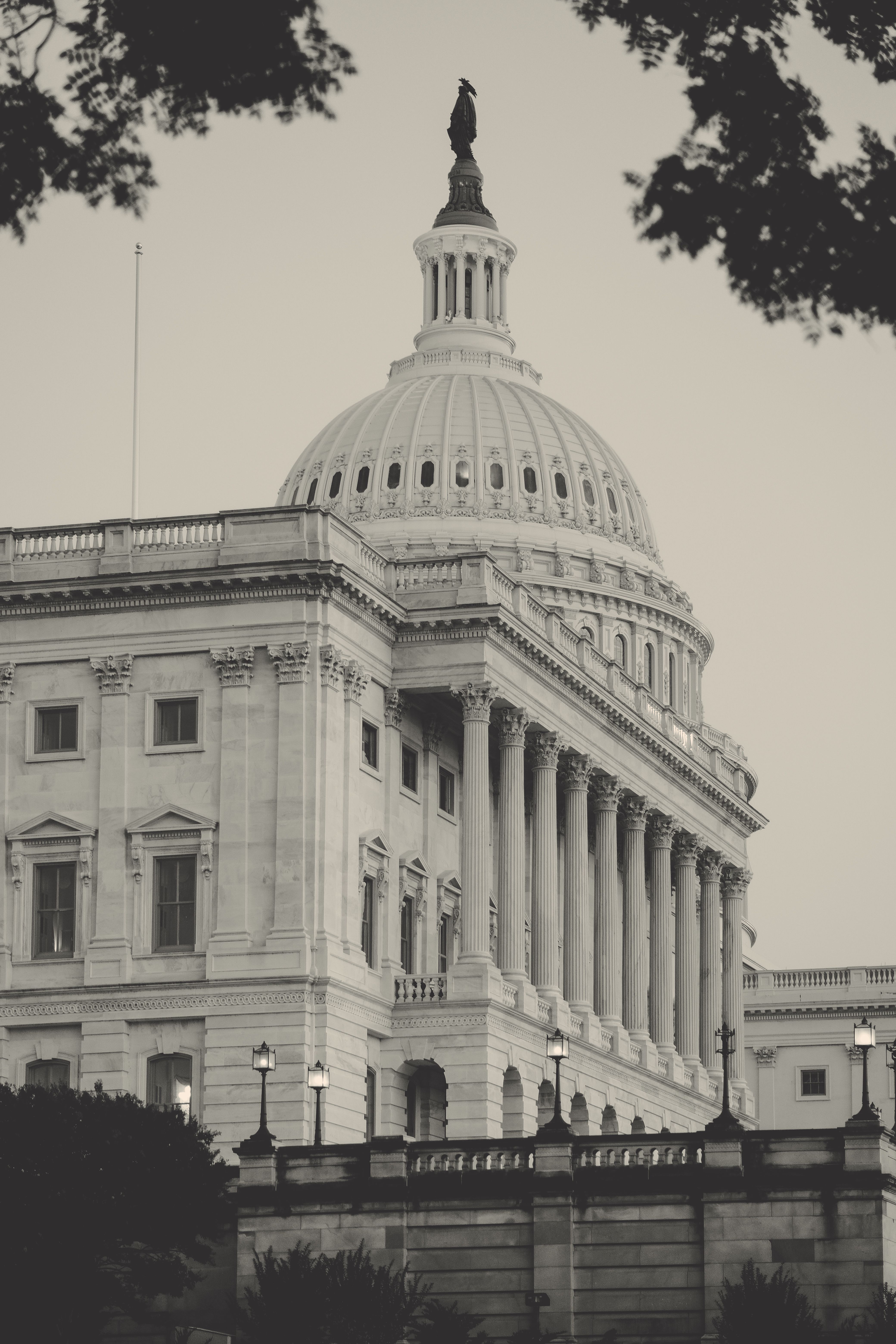 Grayscale Photo of Concrete Building · Free Stock Photo
