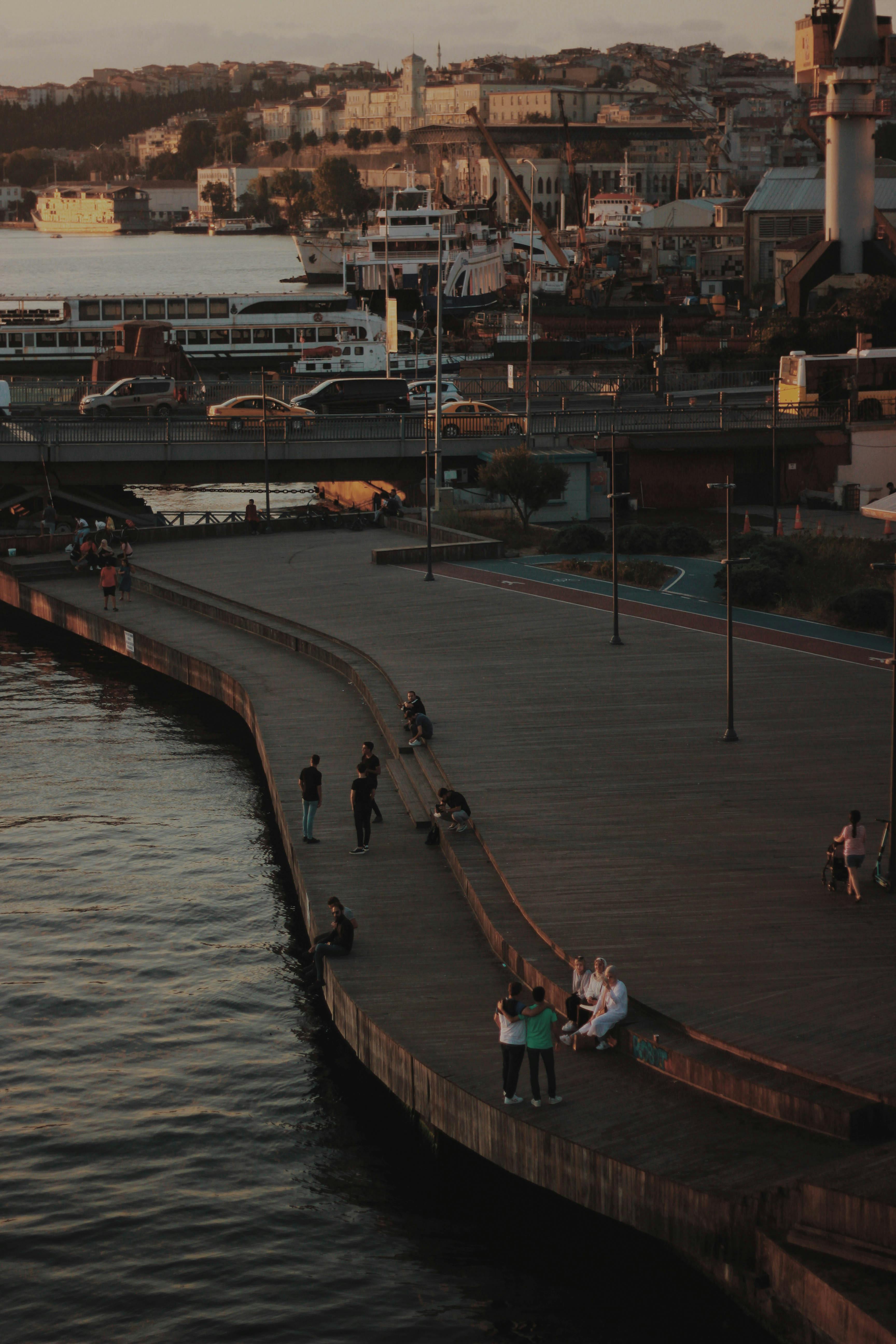 People Walking Near the Sea · Free Stock Photo