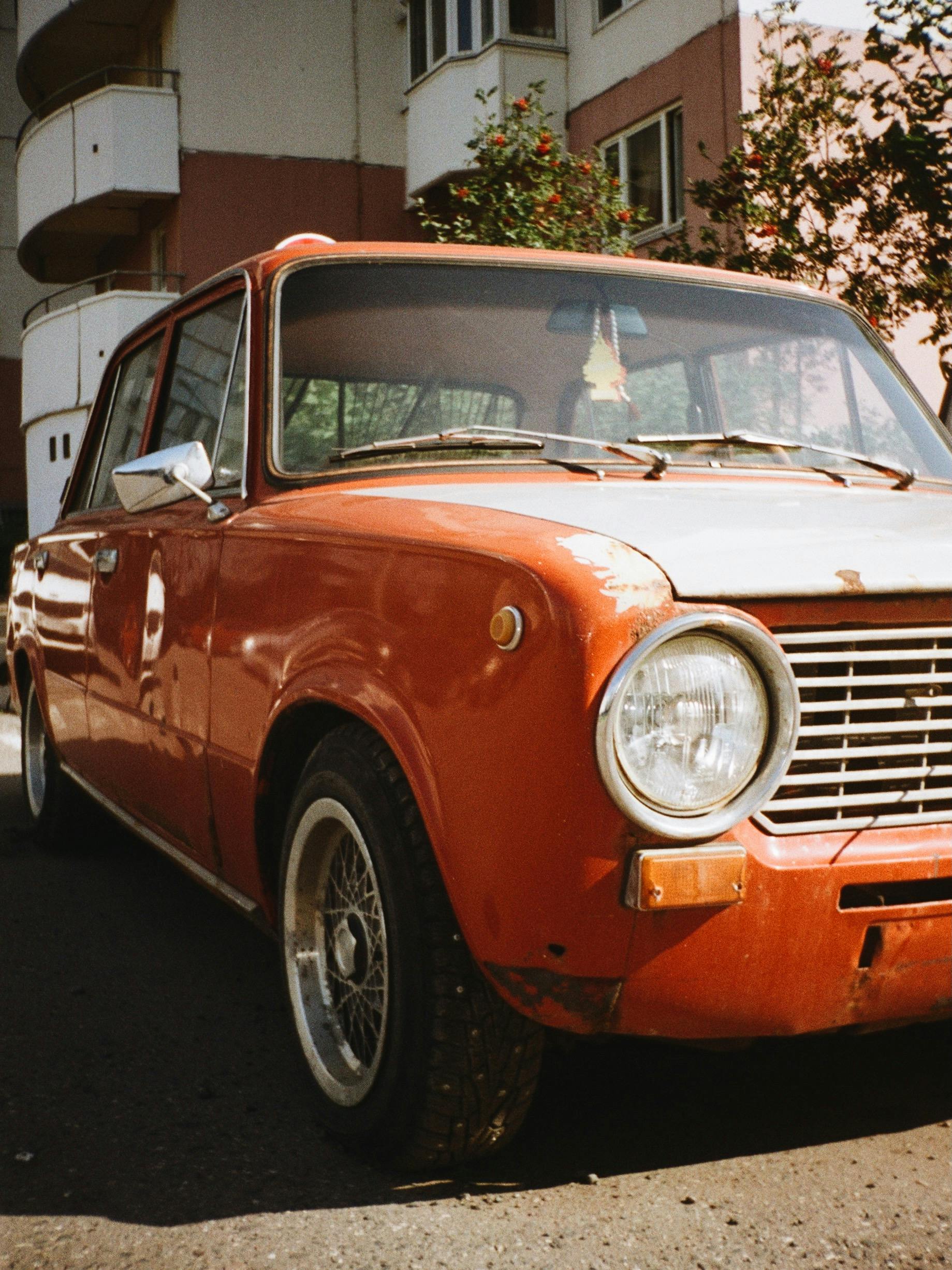 Orange Classic Car Parked on the Street · Free Stock Photo