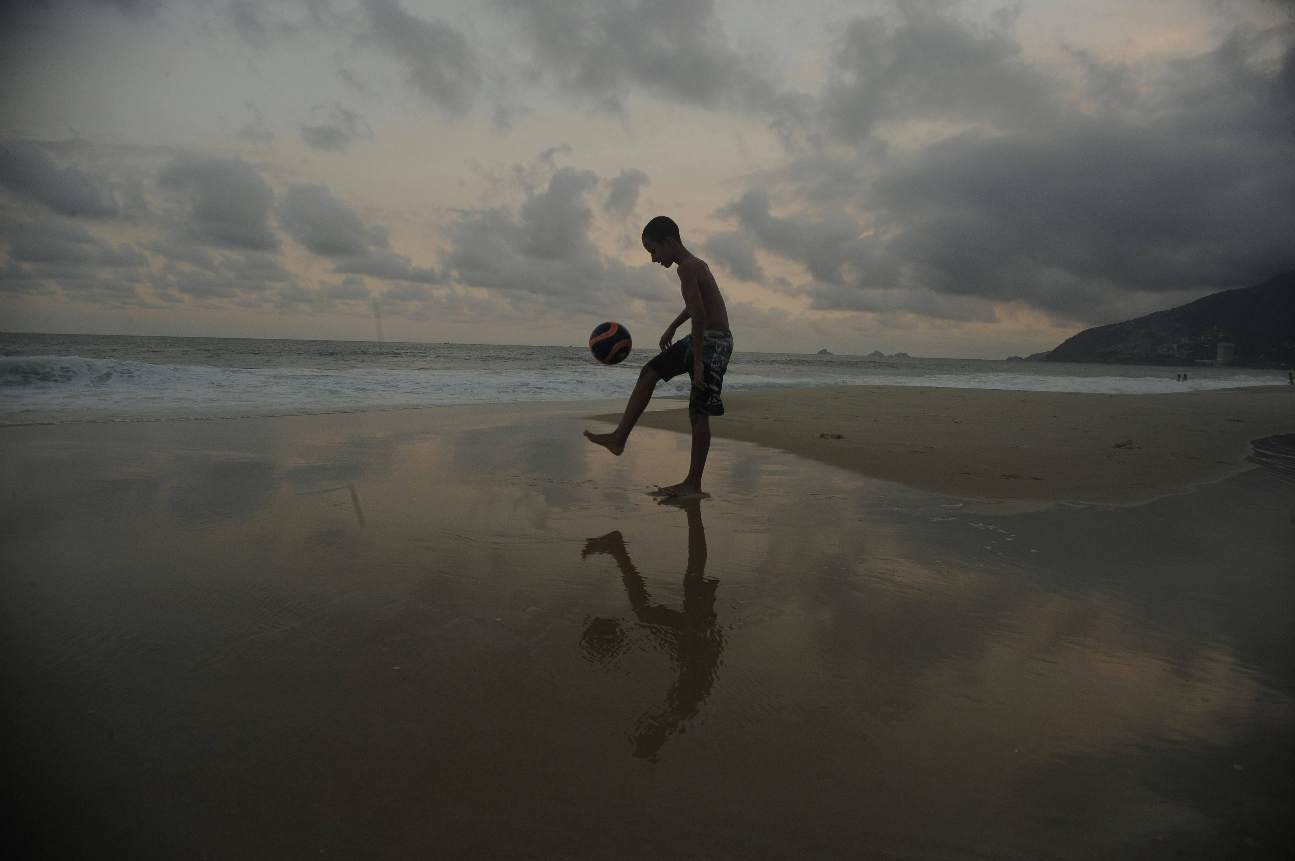 Person playing Ball on Beachside · Free Stock Photo
