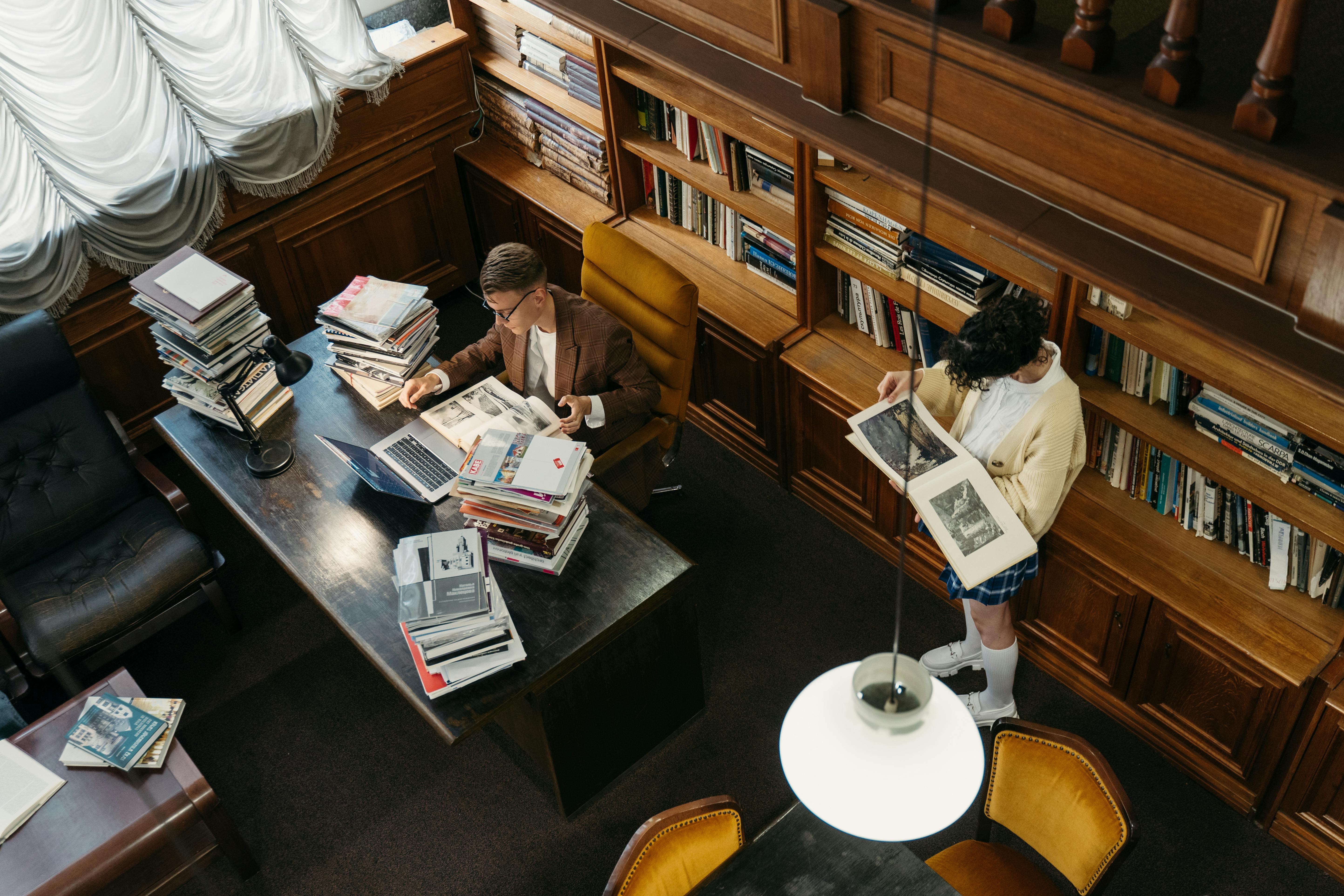 Students Studying in the Library · Free Stock Photo