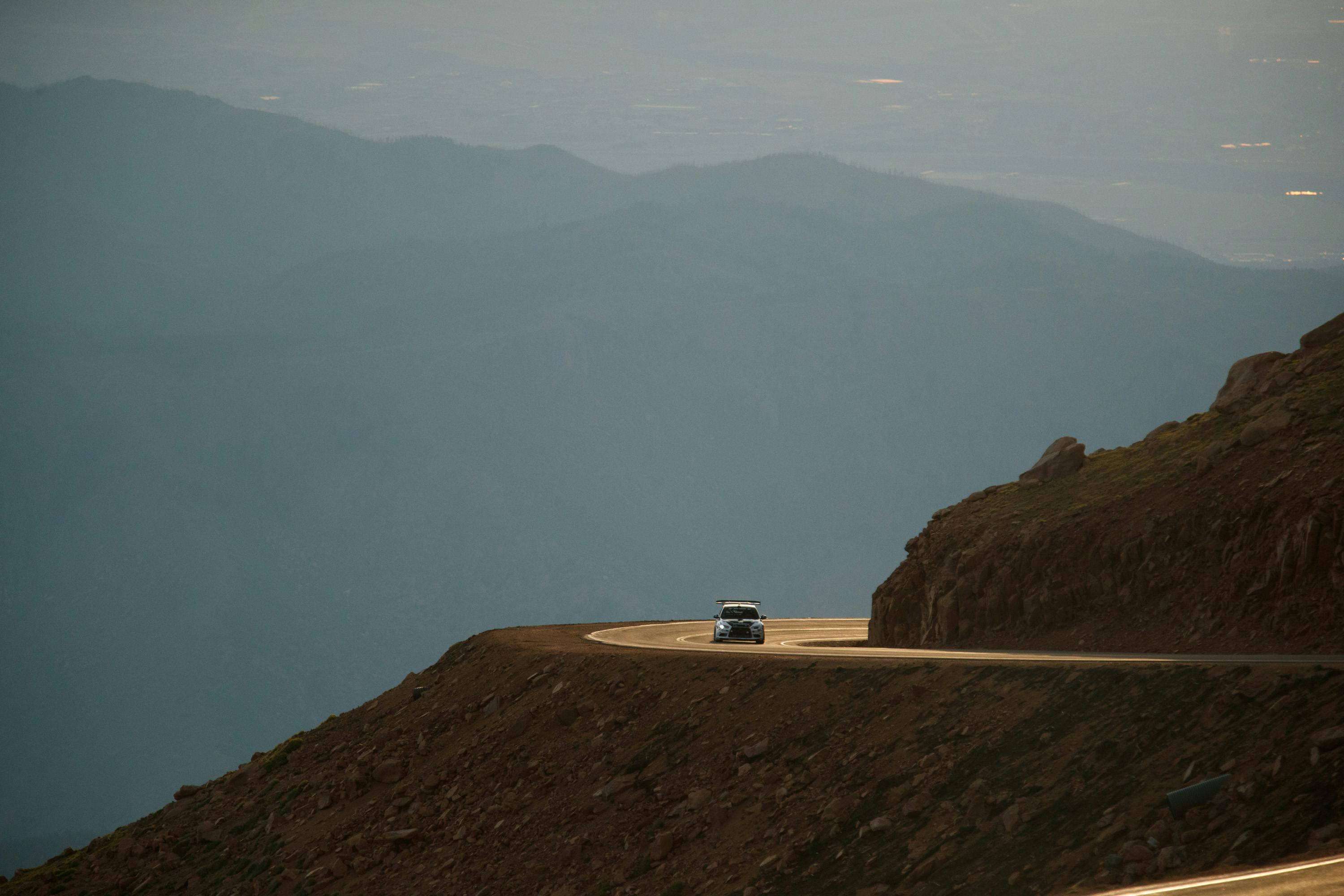 A Car Driving Near a Cliff · Free Stock Photo