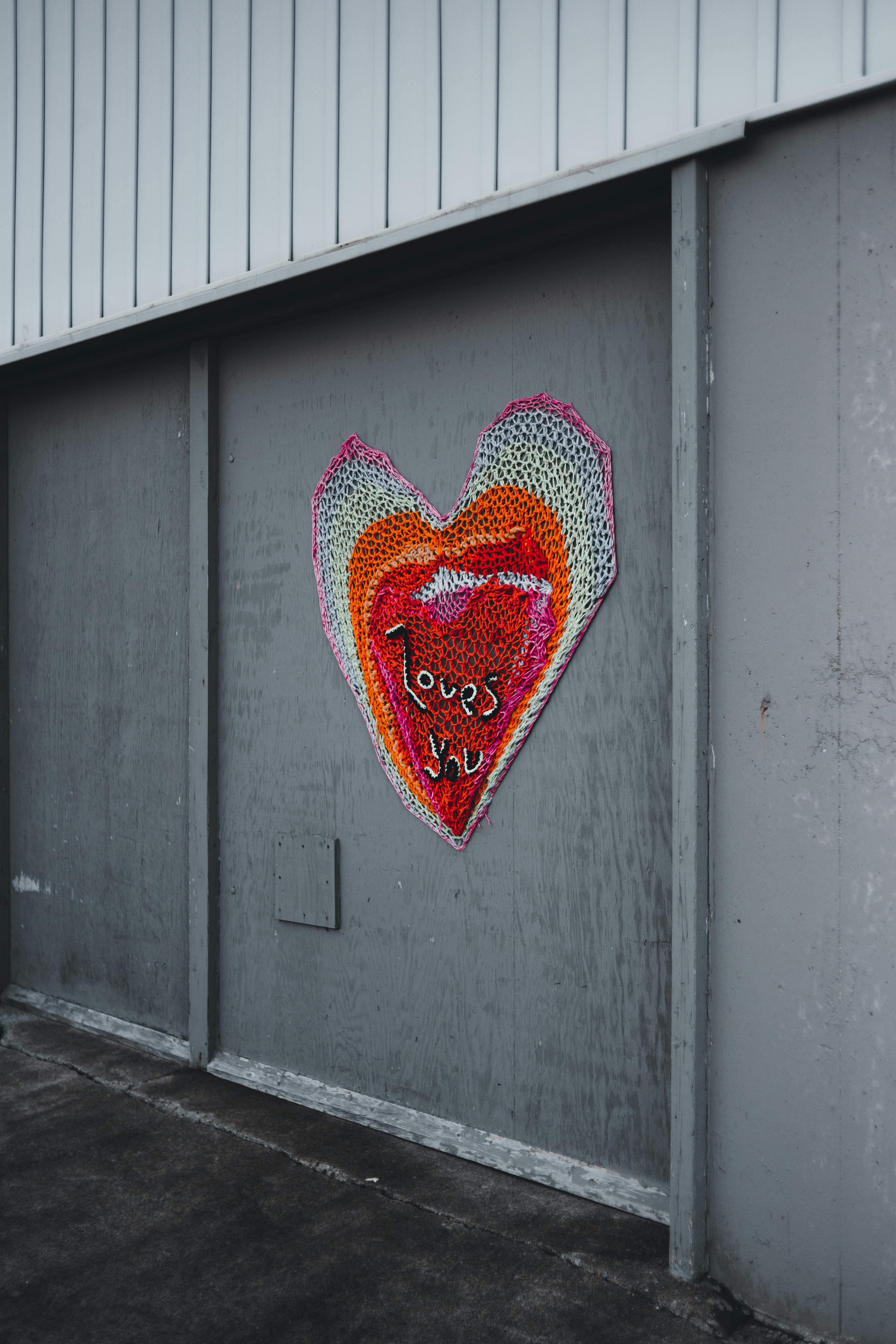 Heart Shaped Design on a Gray Wall · Free Stock Photo