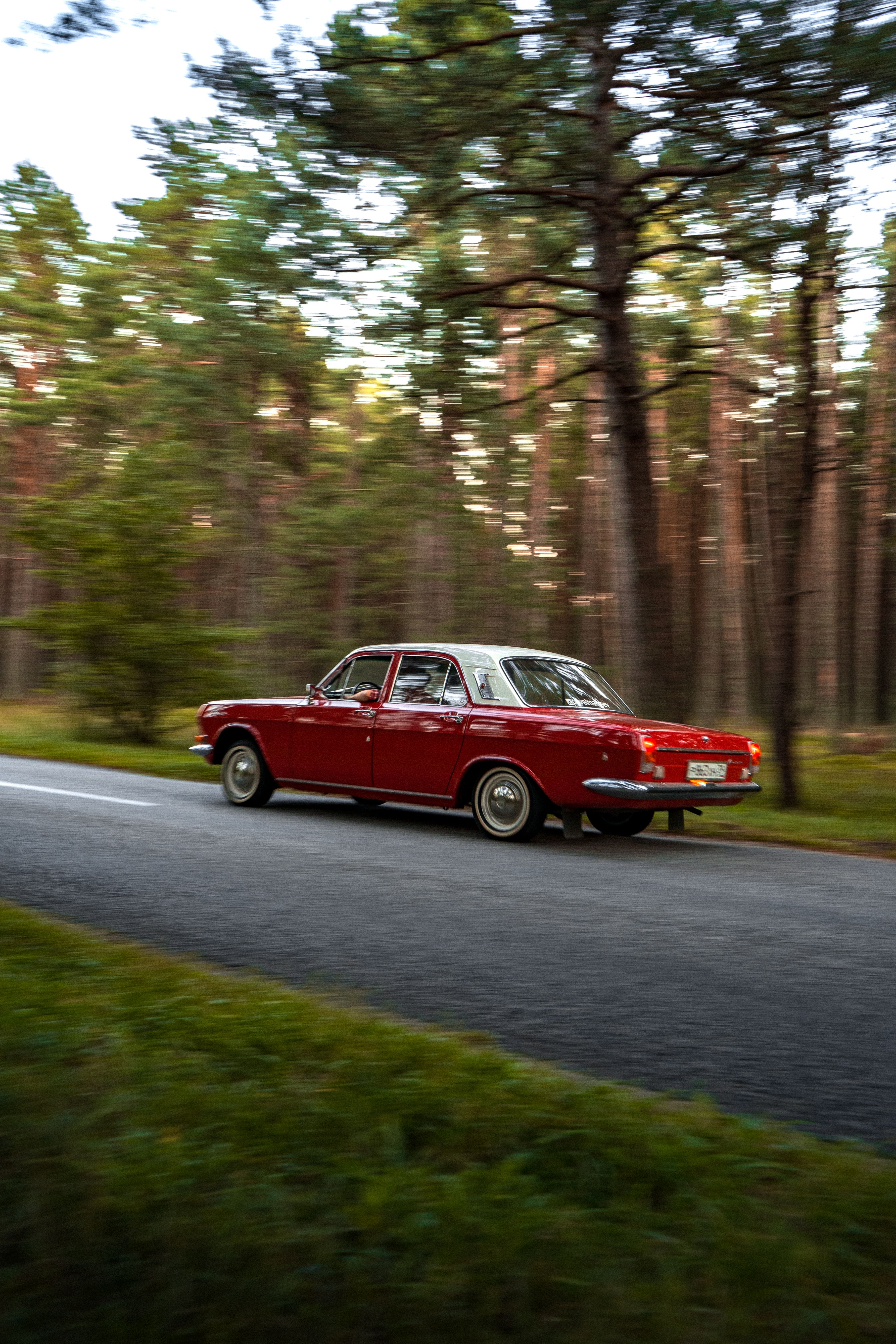 Classic Red Car on Road · Free Stock Photo