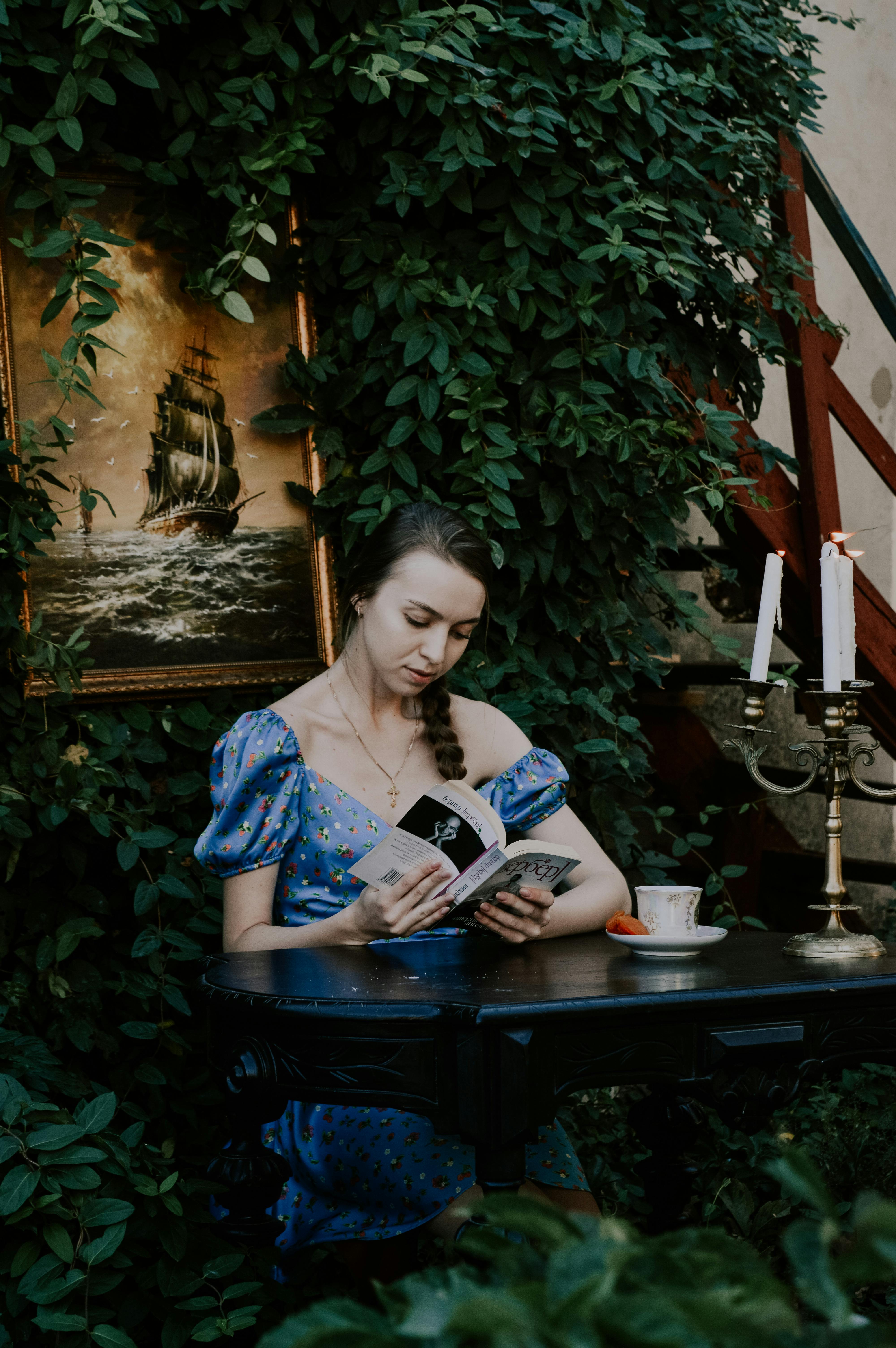 Photo of Woman Reading a Book · Free Stock Photo