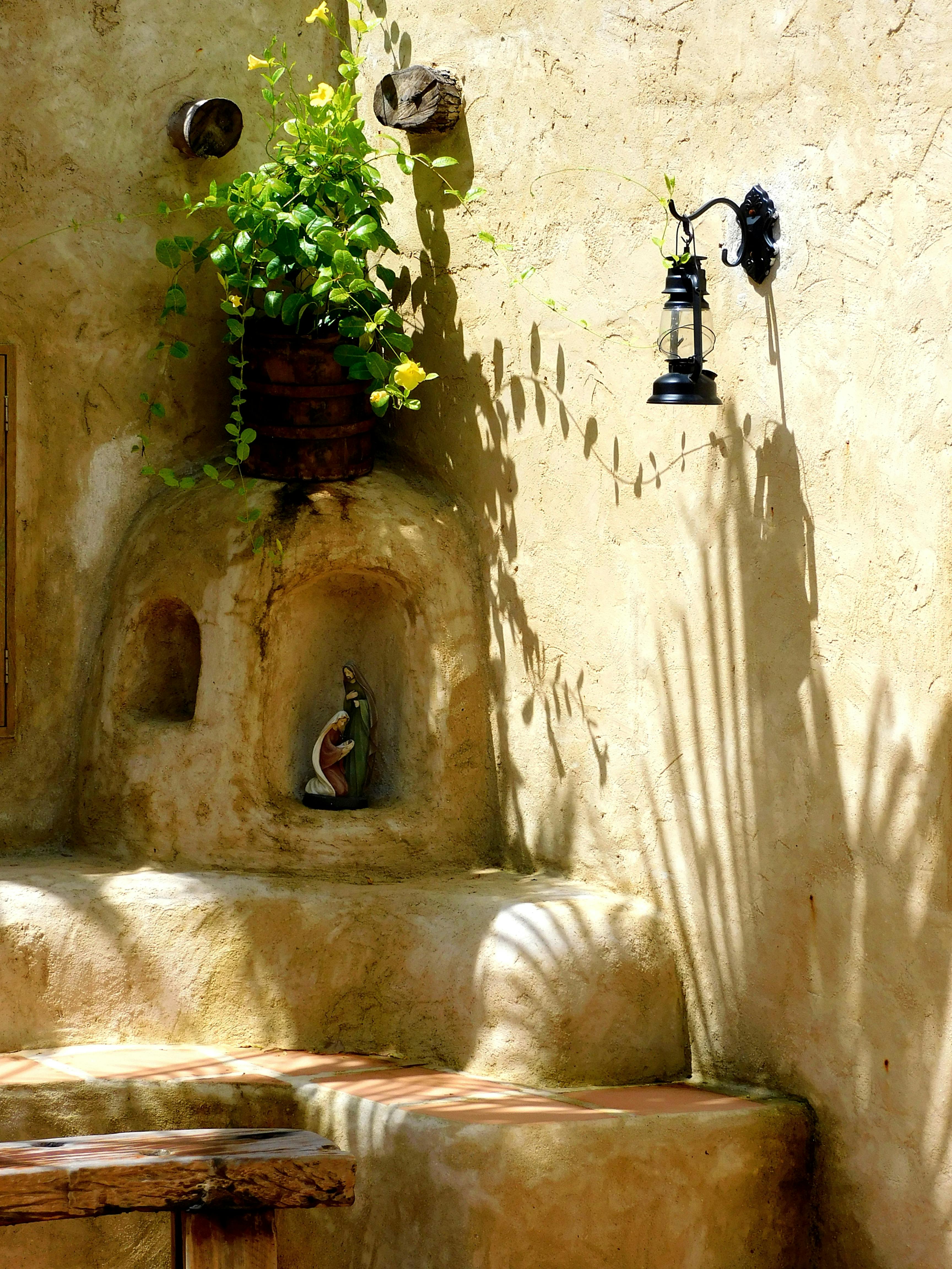 Grotto on Stone Wall · Free Stock Photo