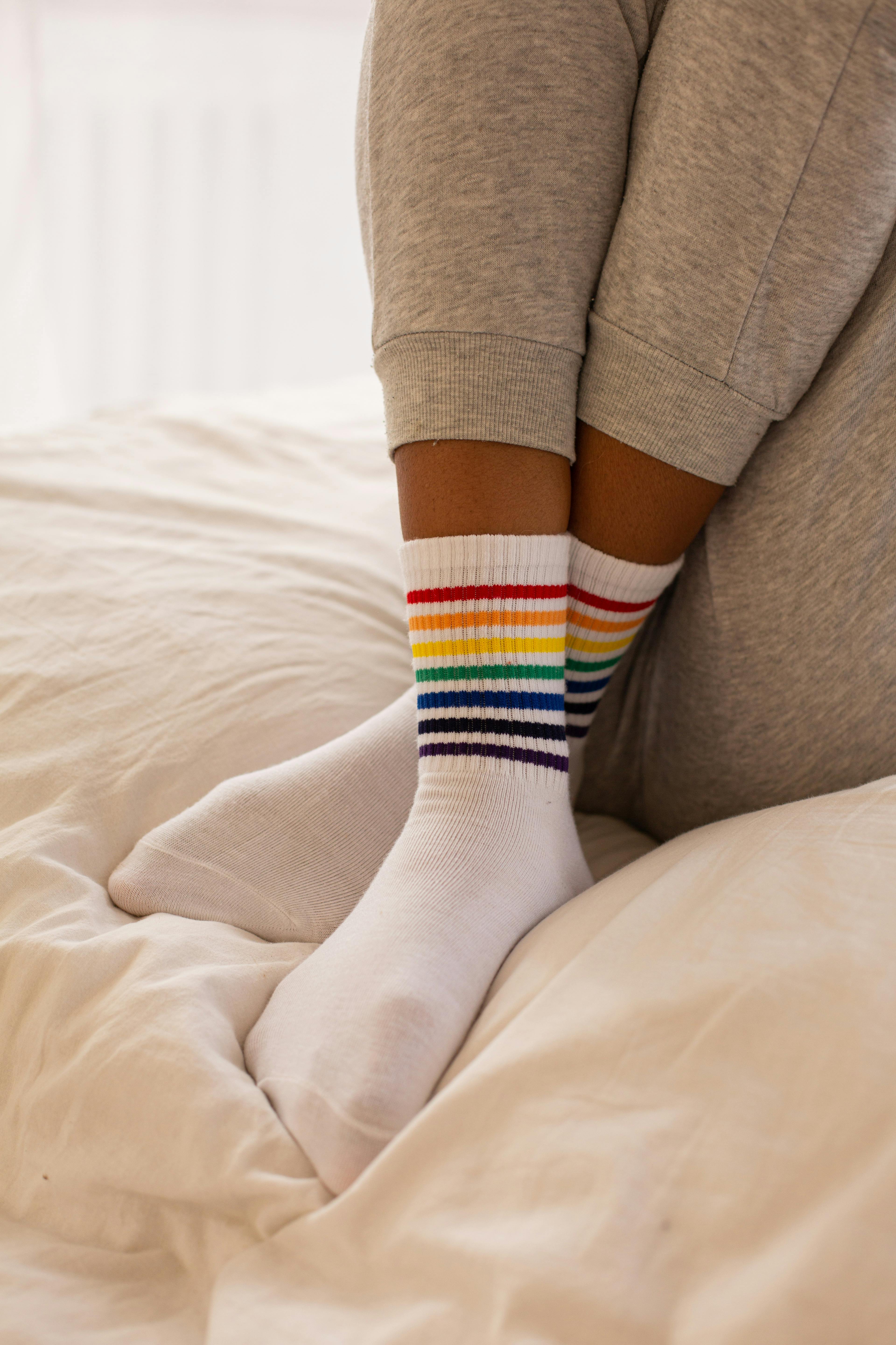 Person Wearing Pride Colored Socks · Free Stock Photo