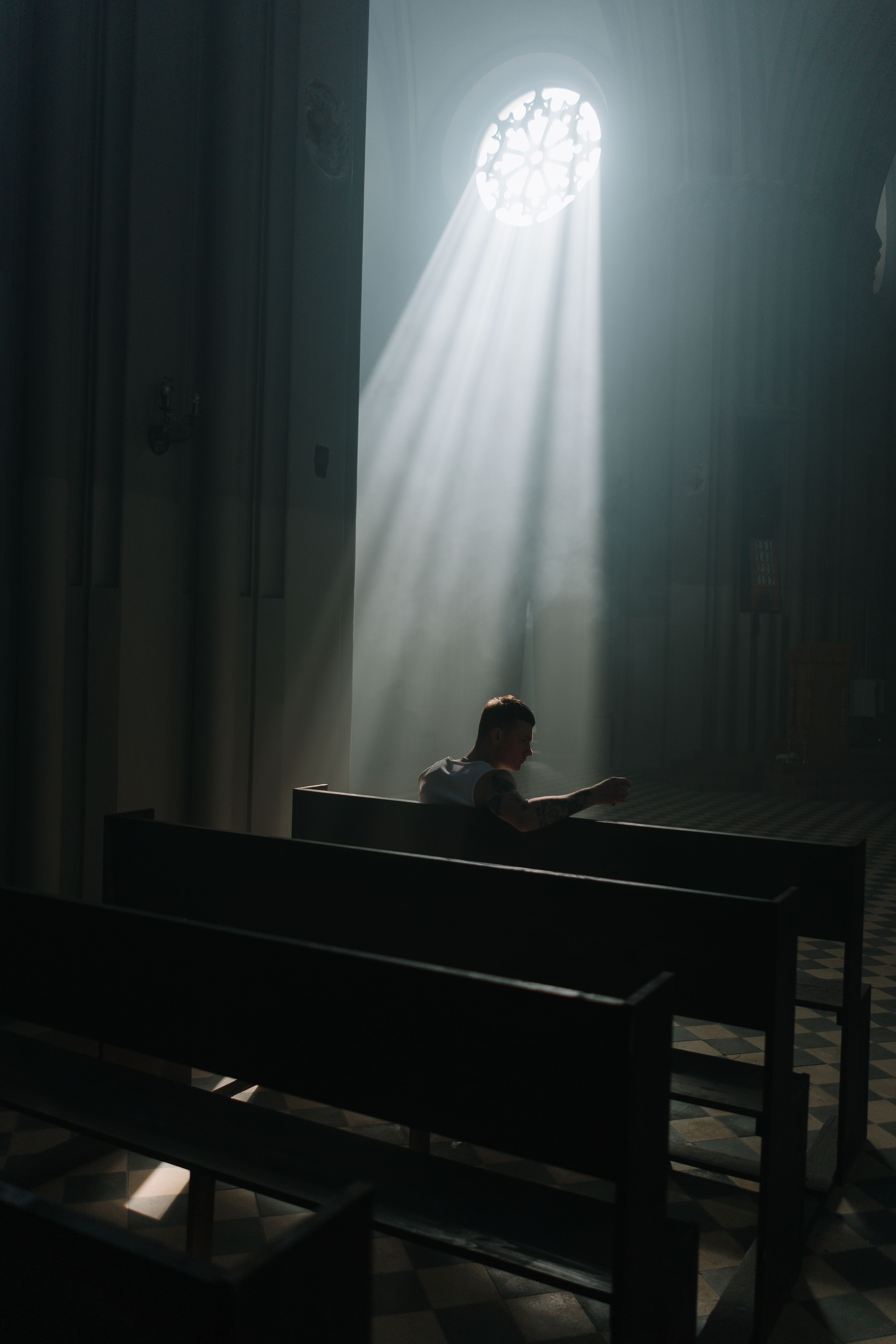 Parishioners sitting on Pews reading Bible · Free Stock Photo