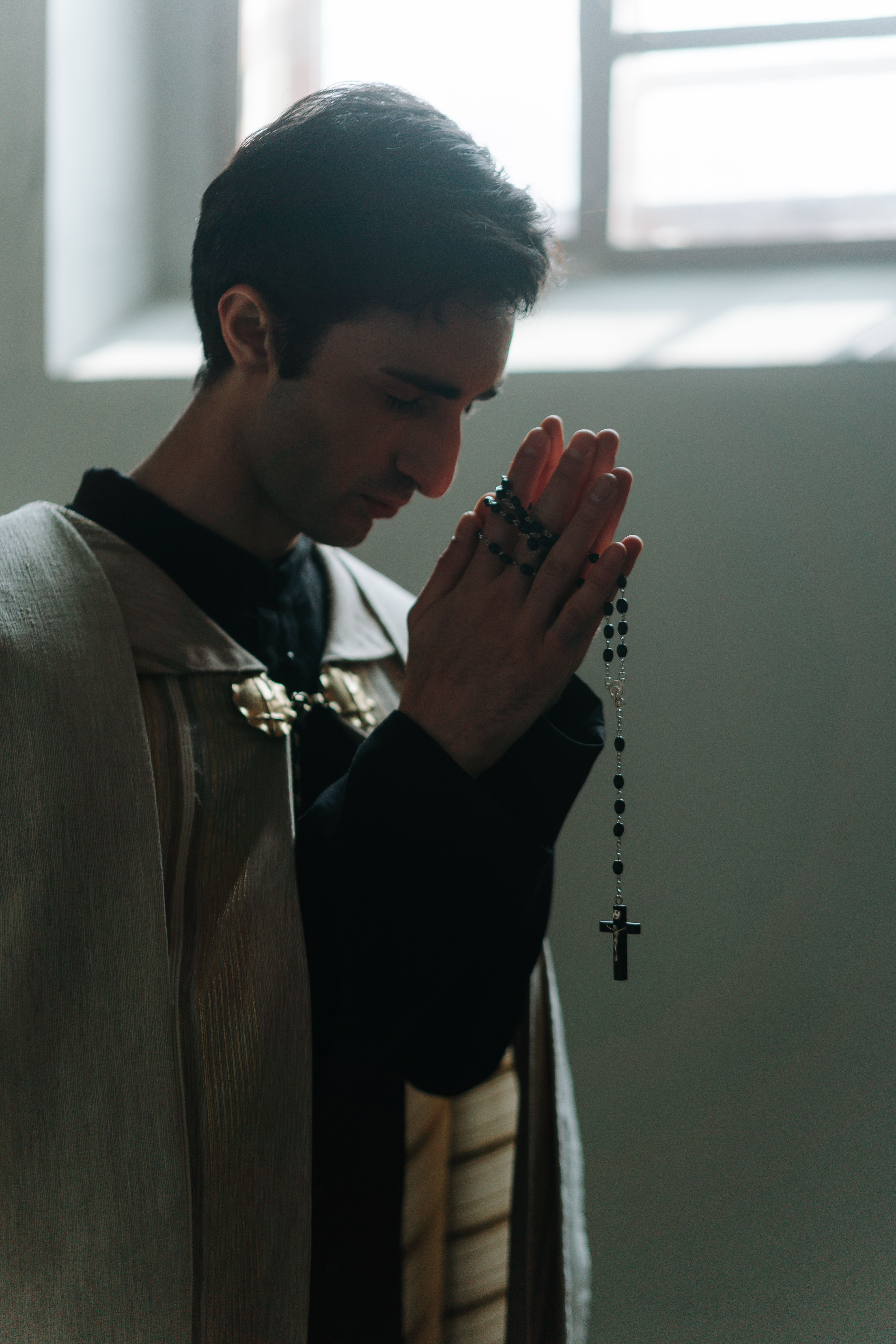 Man Praying with Rosary in Hands · Free Stock Photo