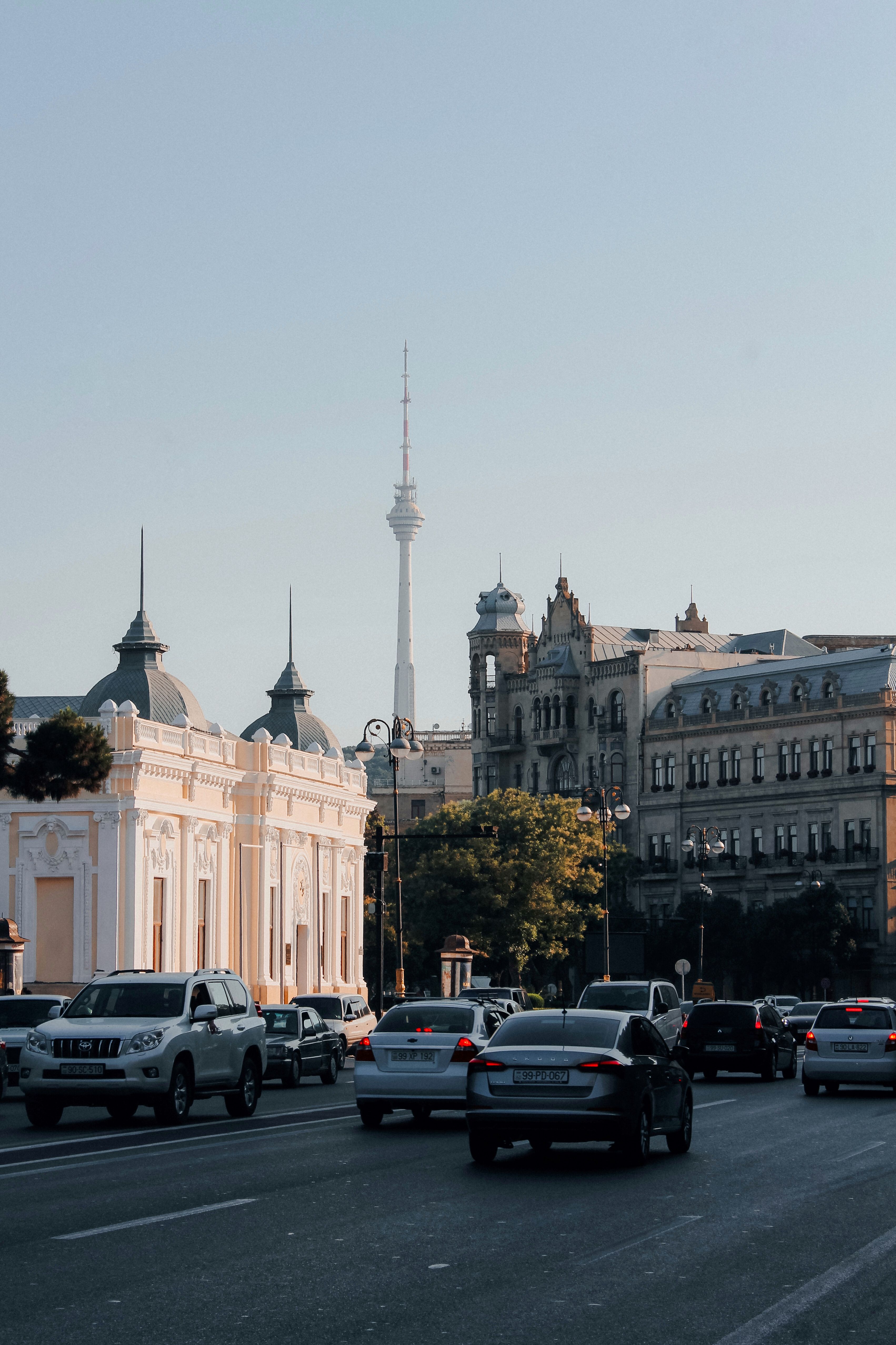 Brown High Rise Building Surrounded by People · Free Stock Photo
