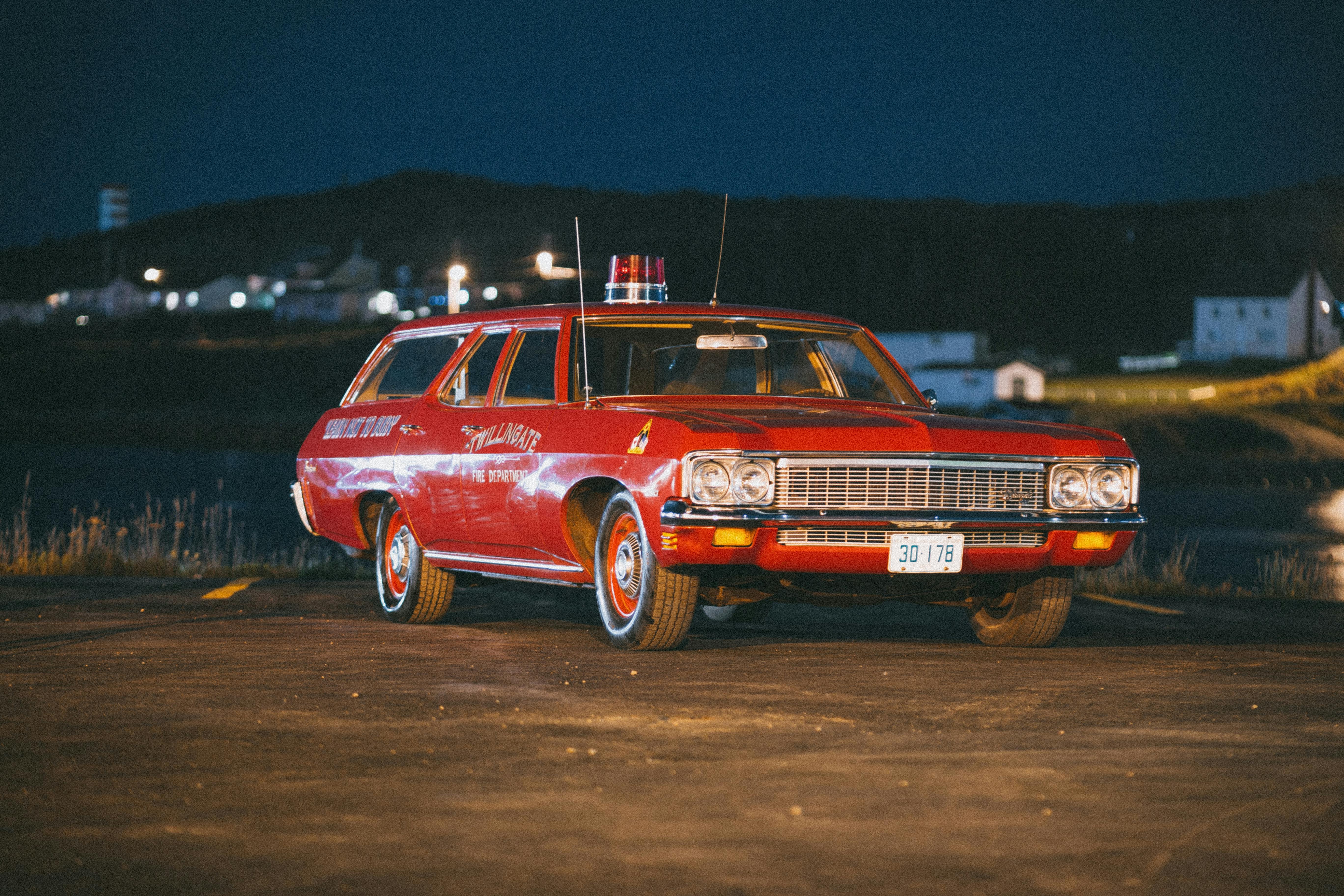 Red Car Parked on the Parking Lot · Free Stock Photo