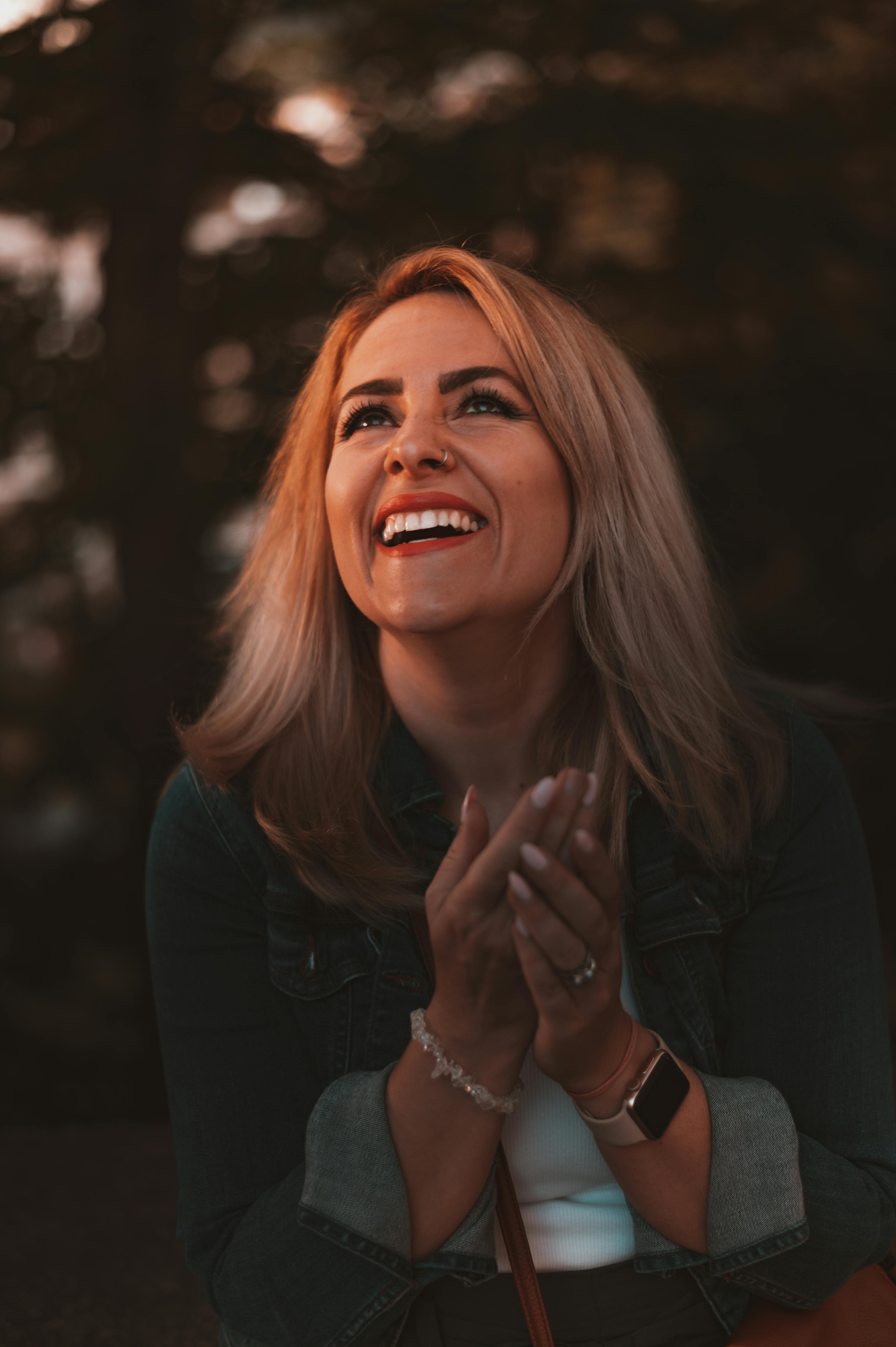 Close-Up Photography of Smiling Woman · Free Stock Photo