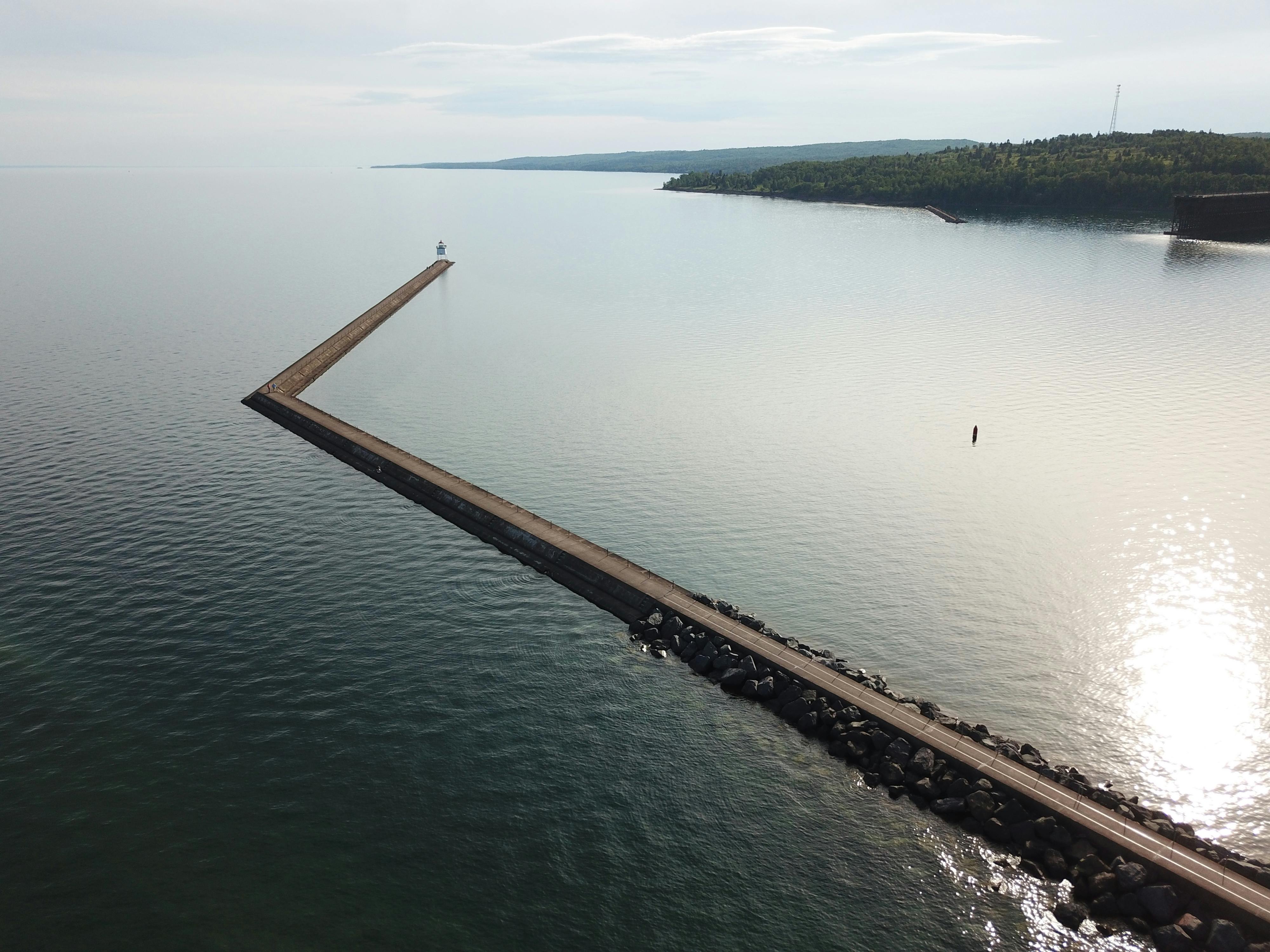Couple on a Jetty · Free Stock Photo