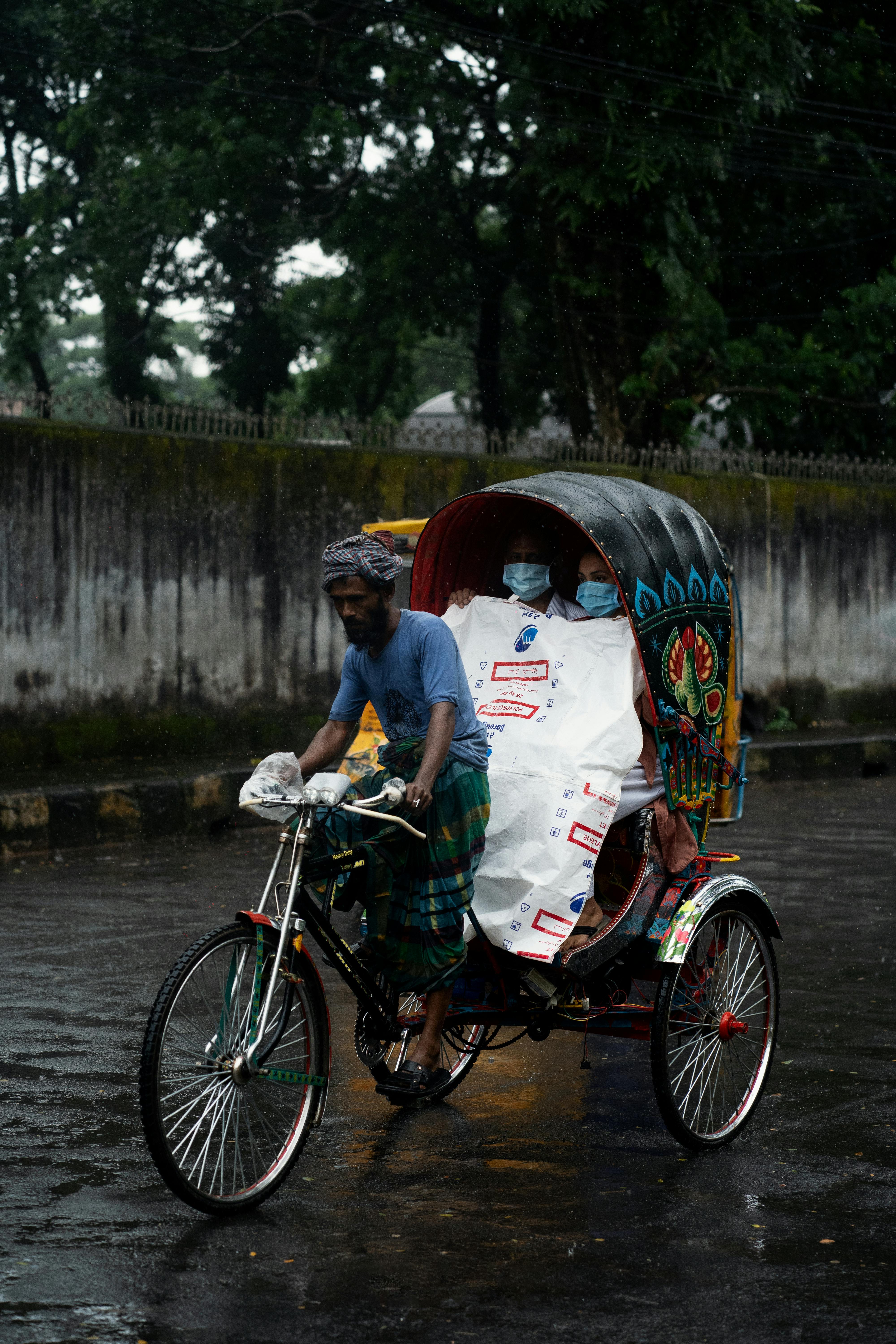 Man Riding Rickshaw · Free Stock Photo