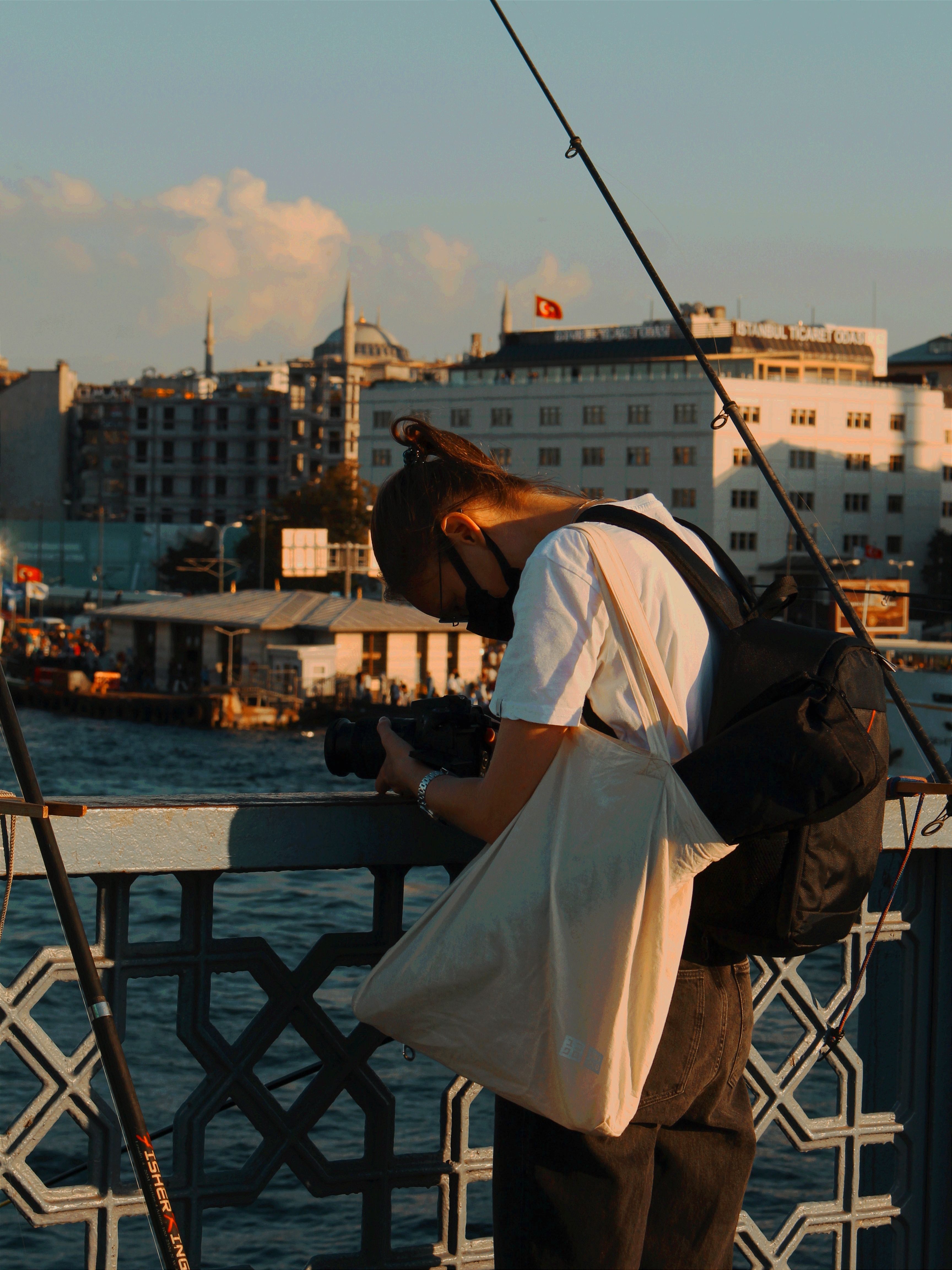 Man in White Shirt Using a Camera · Free Stock Photo