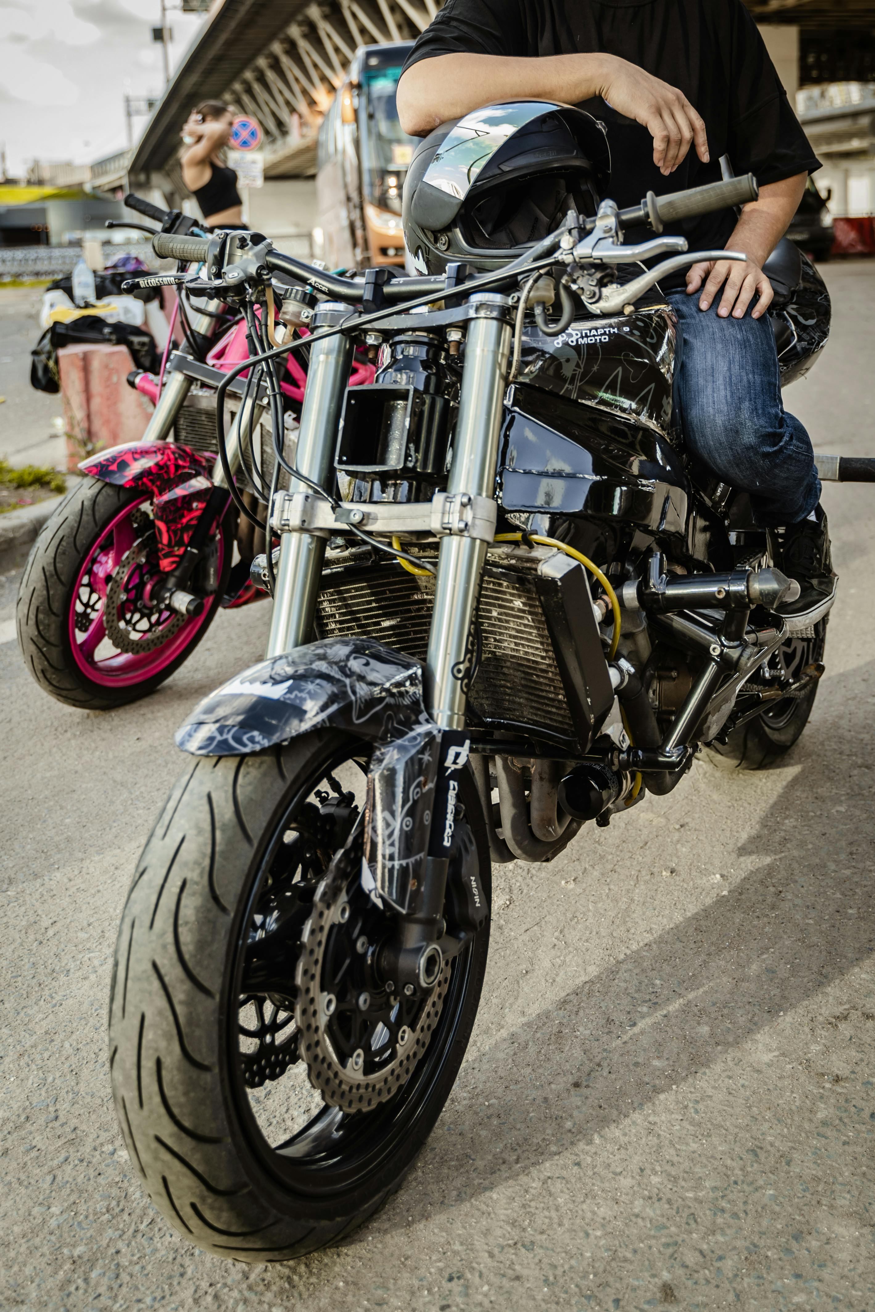 Person Sitting on a Motorcycle · Free Stock Photo