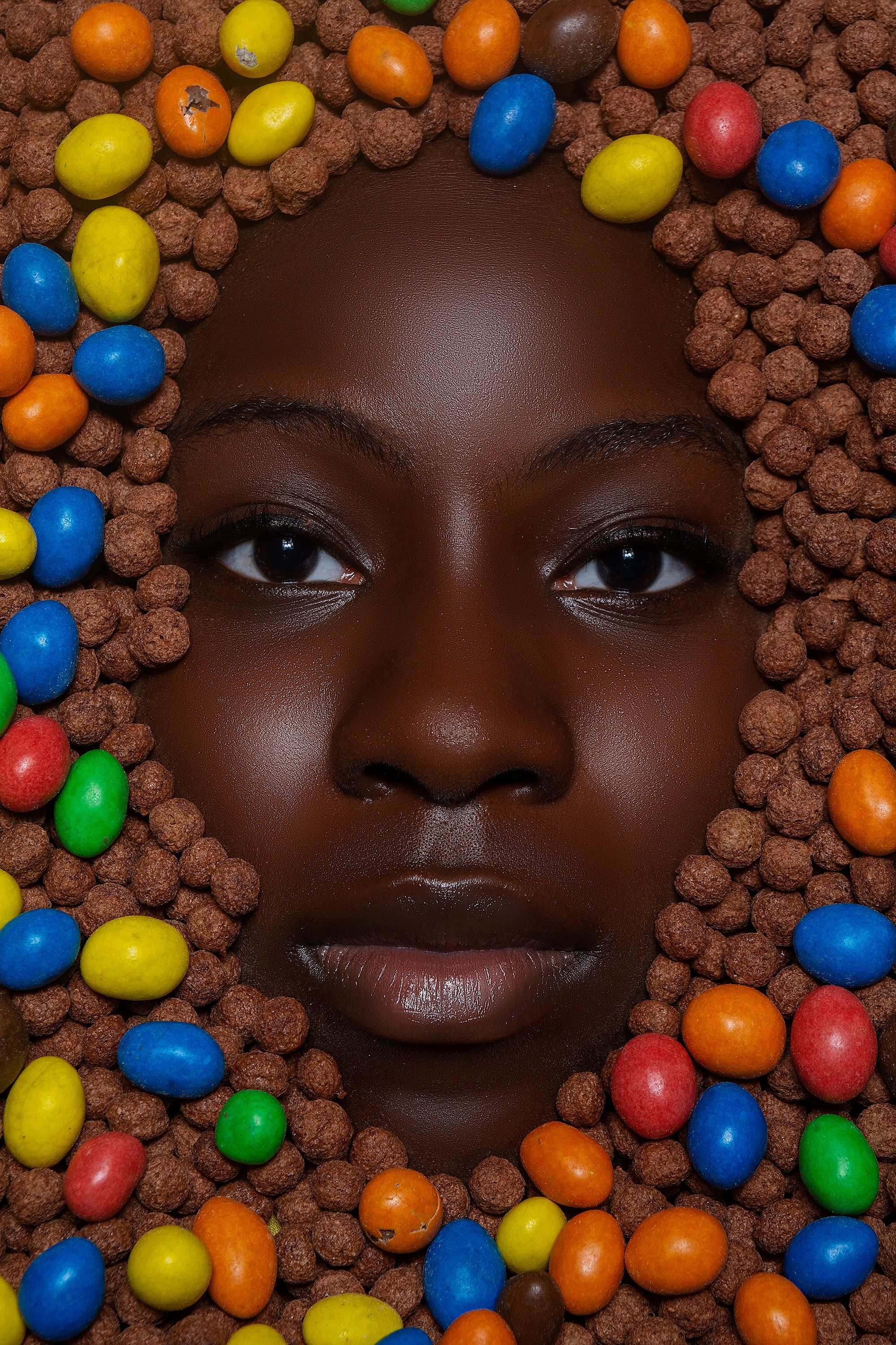 Face of a Woman amidst Sweets · Free Stock Photo