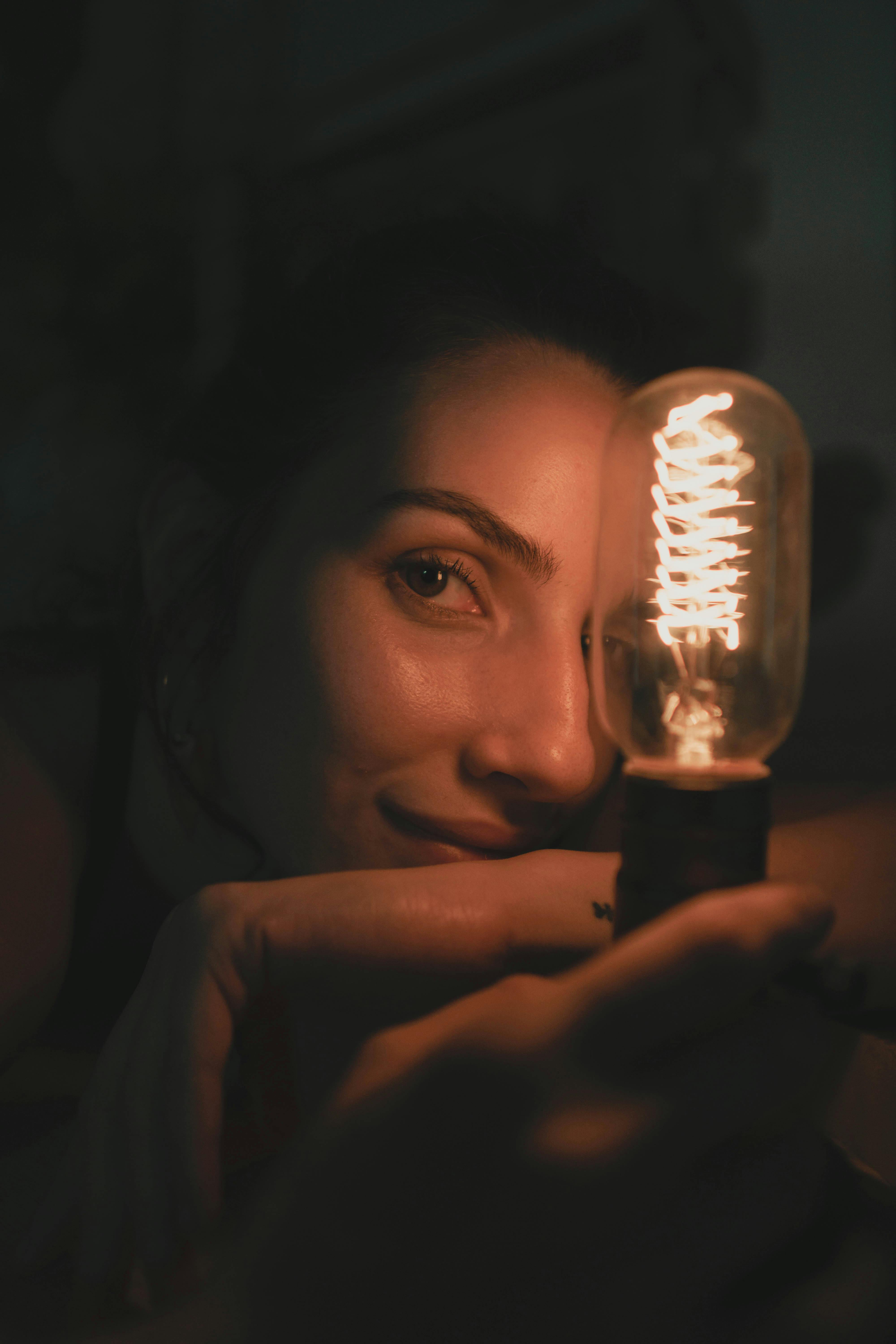 Paperclip in a Shape of a Light Bulb and a Rubber Eraser in a Shape of ...