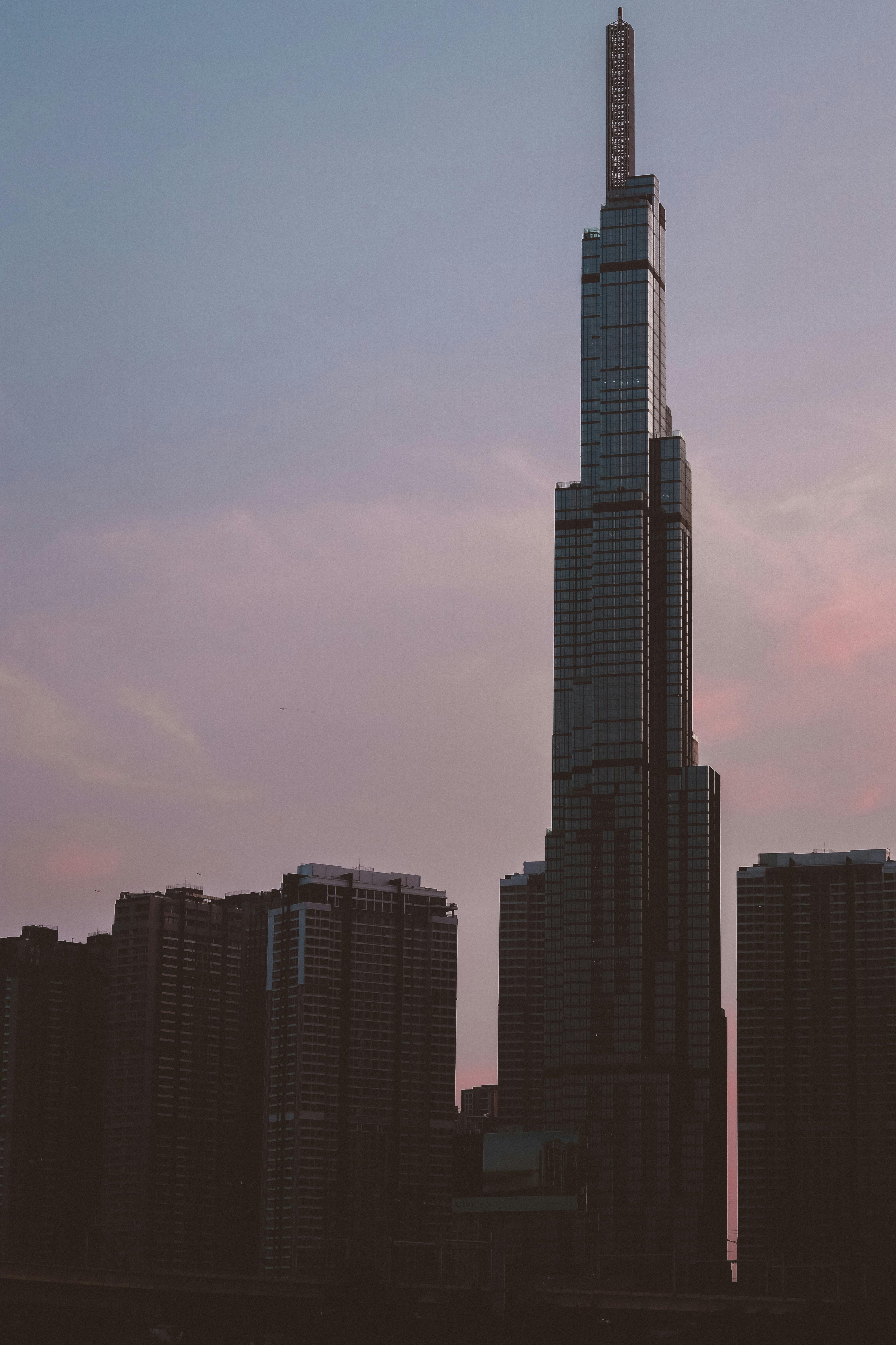 Blocks of Flats and Skyscraper at Dawn · Free Stock Photo