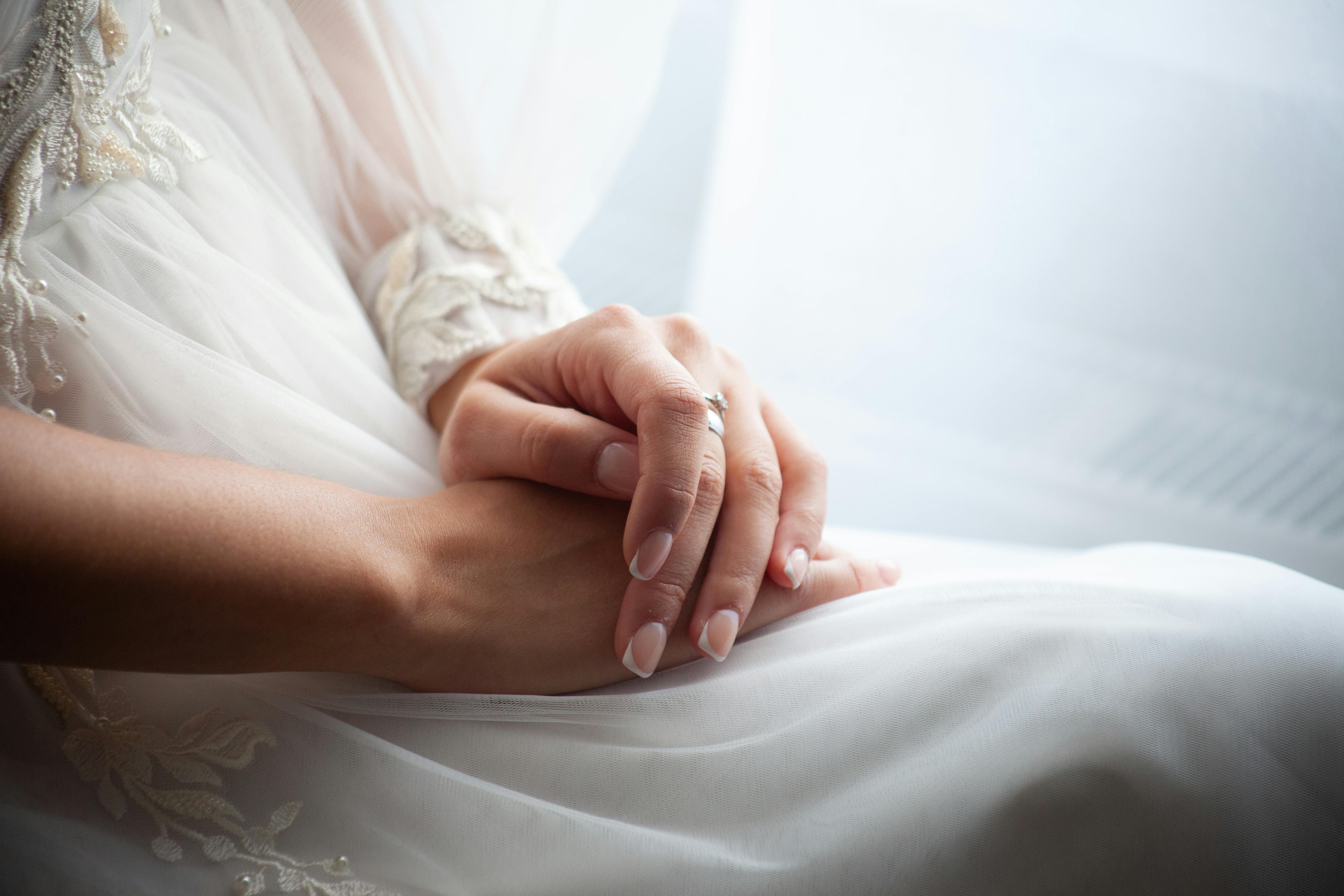 Close-up of Woman Wearing a Ring with a Rock · Free Stock Photo