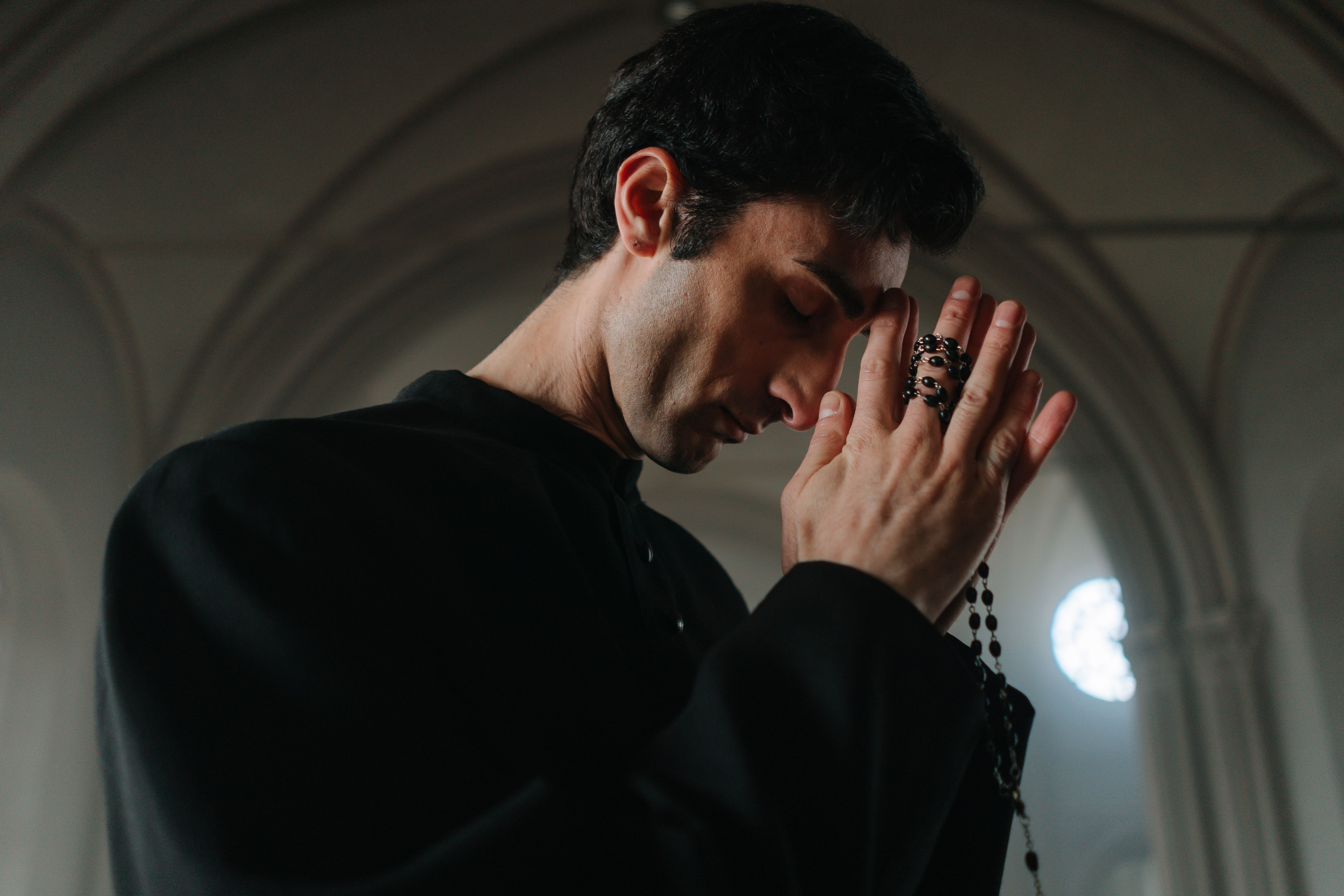 Backview of Priest in Black Cassock · Free Stock Photo
