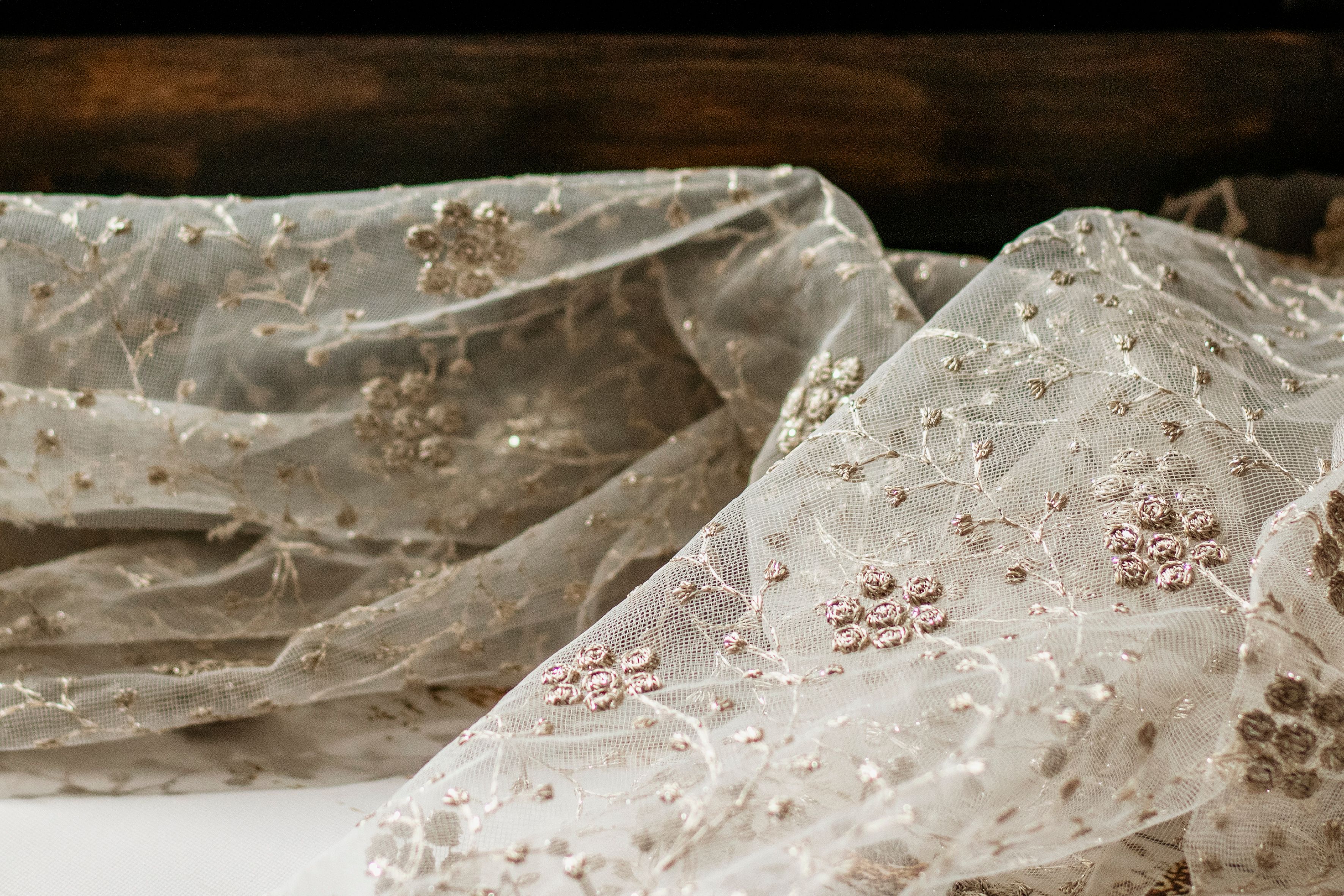Close-Up Photo of Embroidered Tulle Fabric · Free Stock Photo