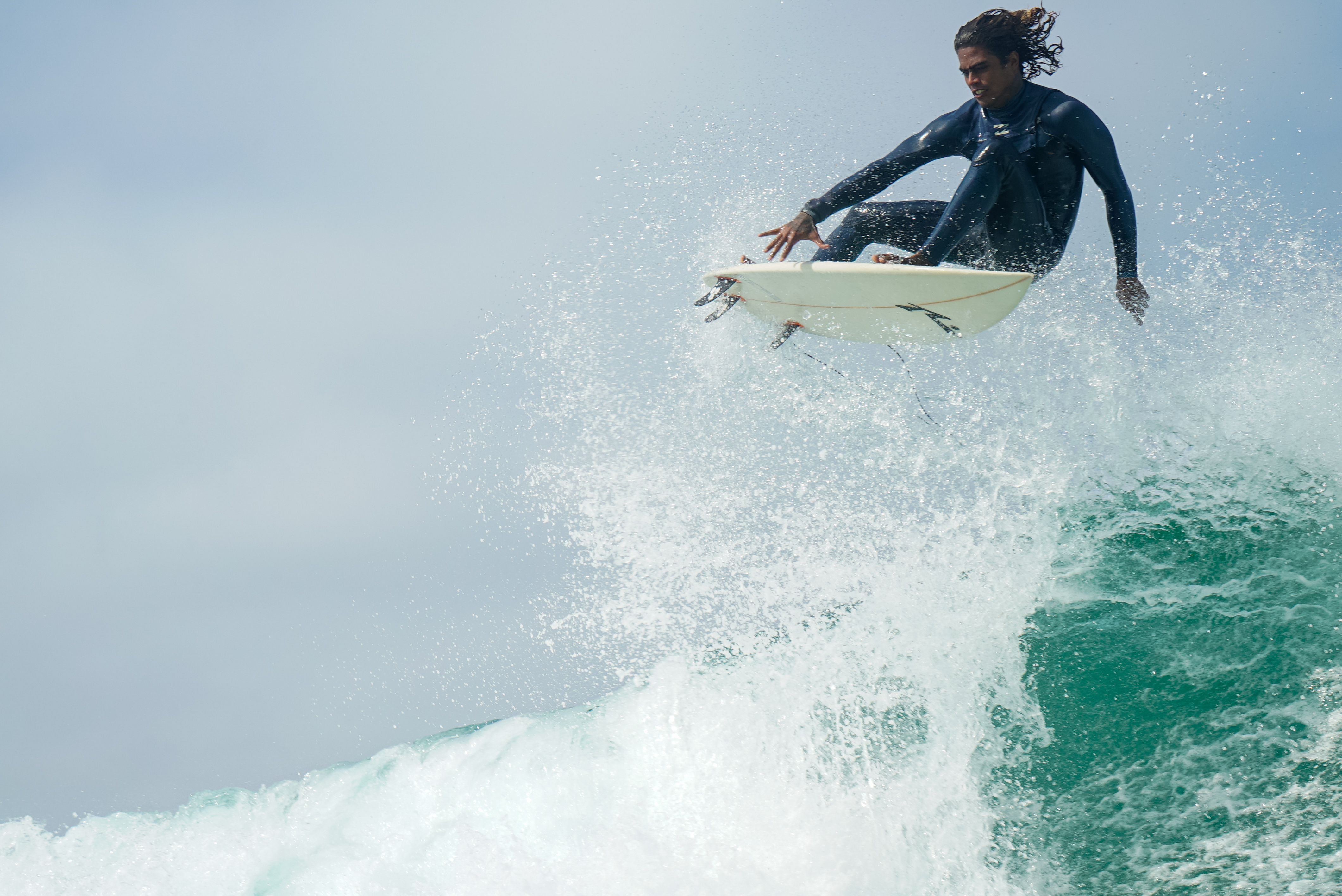 Man Jumping on a Surfboard, and Water Splash · Free Stock Photo