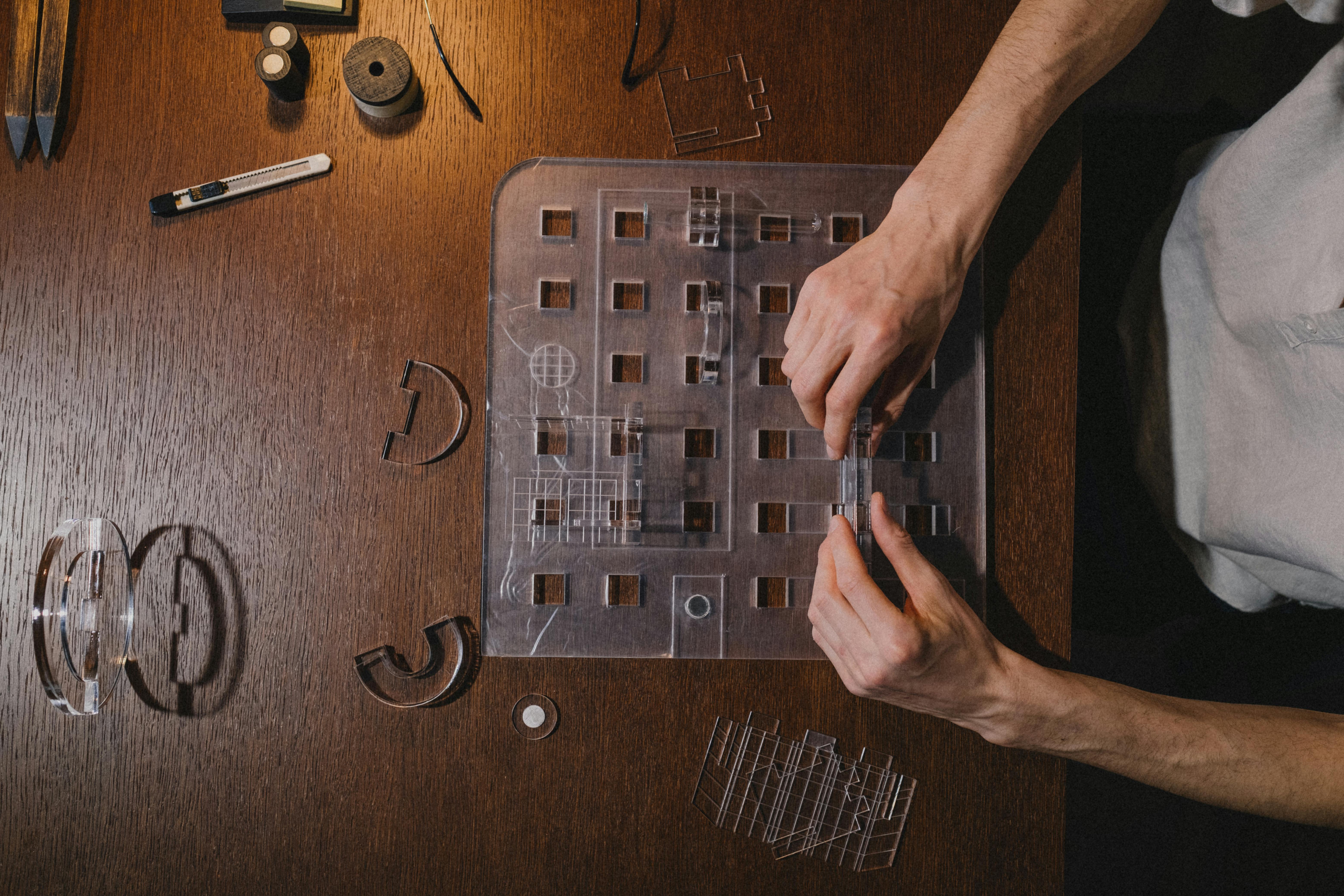 Architect making model at home · Free Stock Photo