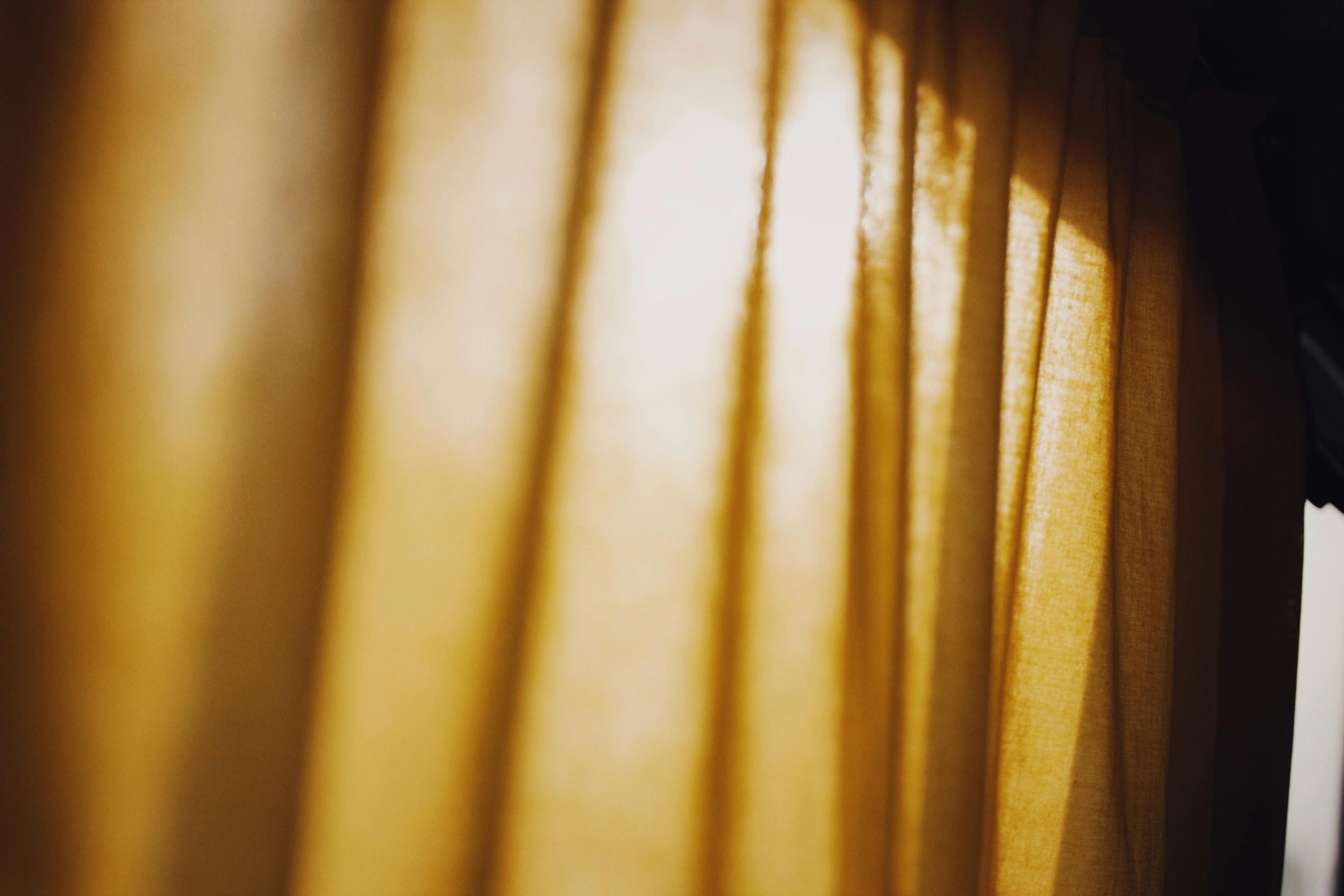 Close-up View of Curtains with Floral Theme · Free Stock Photo