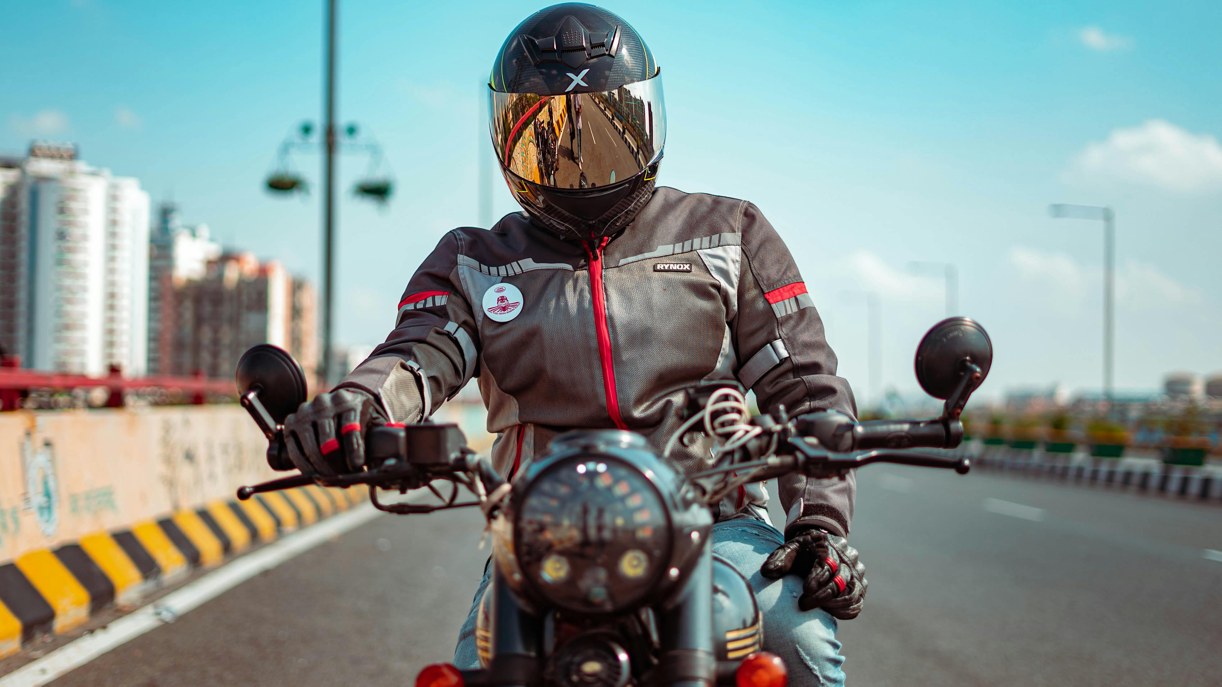 Man in Motorcycle Suit · Free Stock Photo