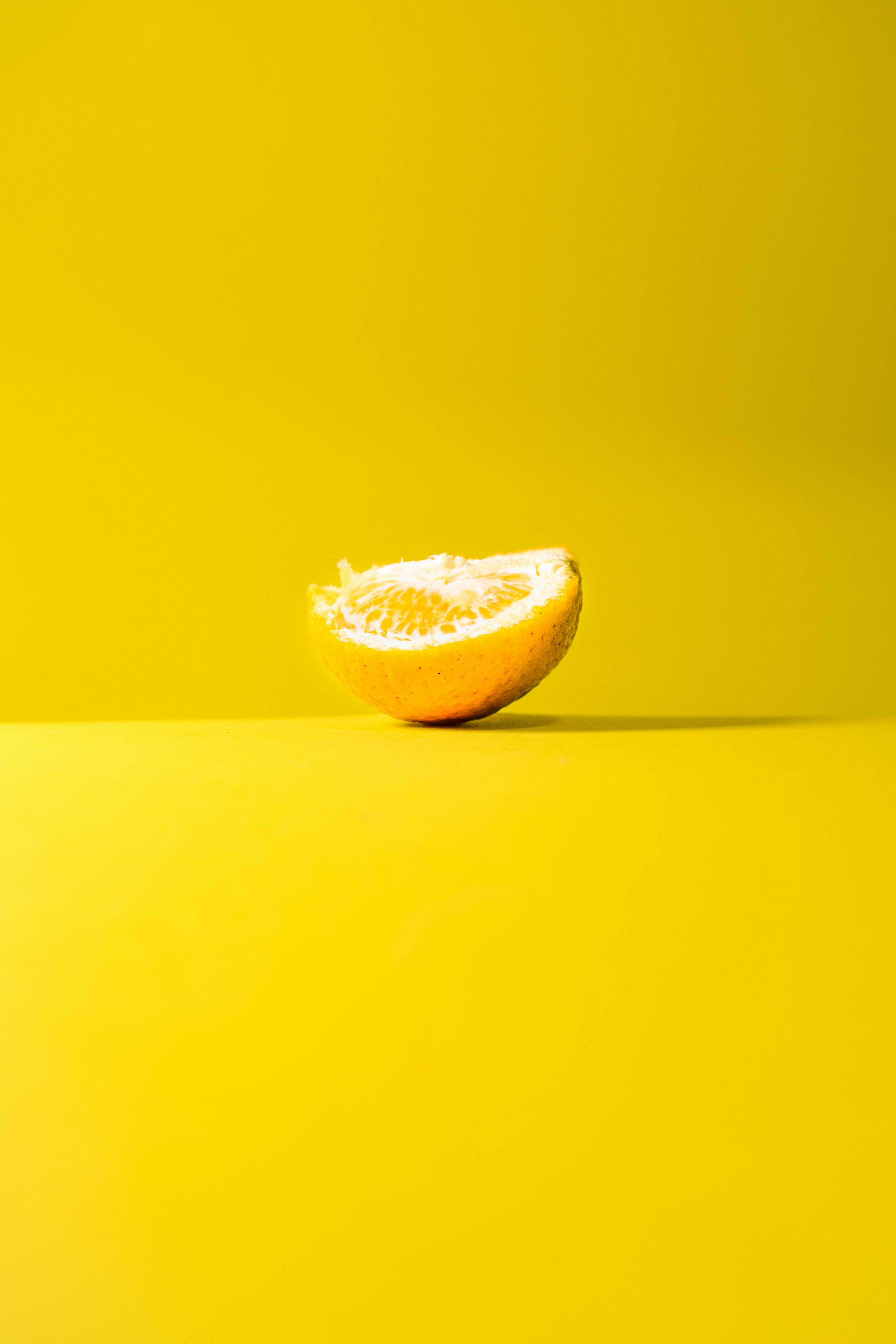 Photo of Yellow Lemon on Gray Surface · Free Stock Photo