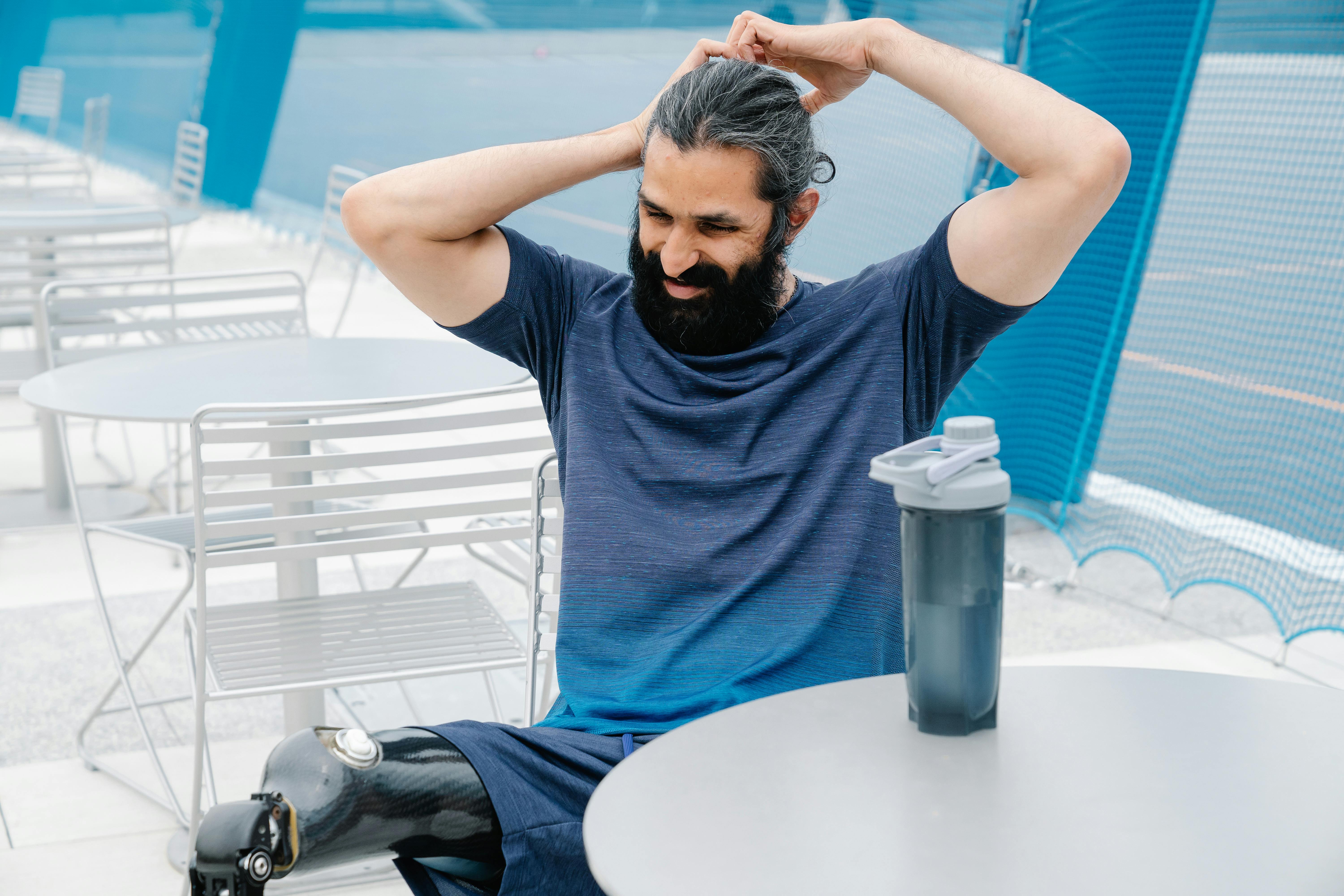 Man fixing his Hair · Free Stock Photo