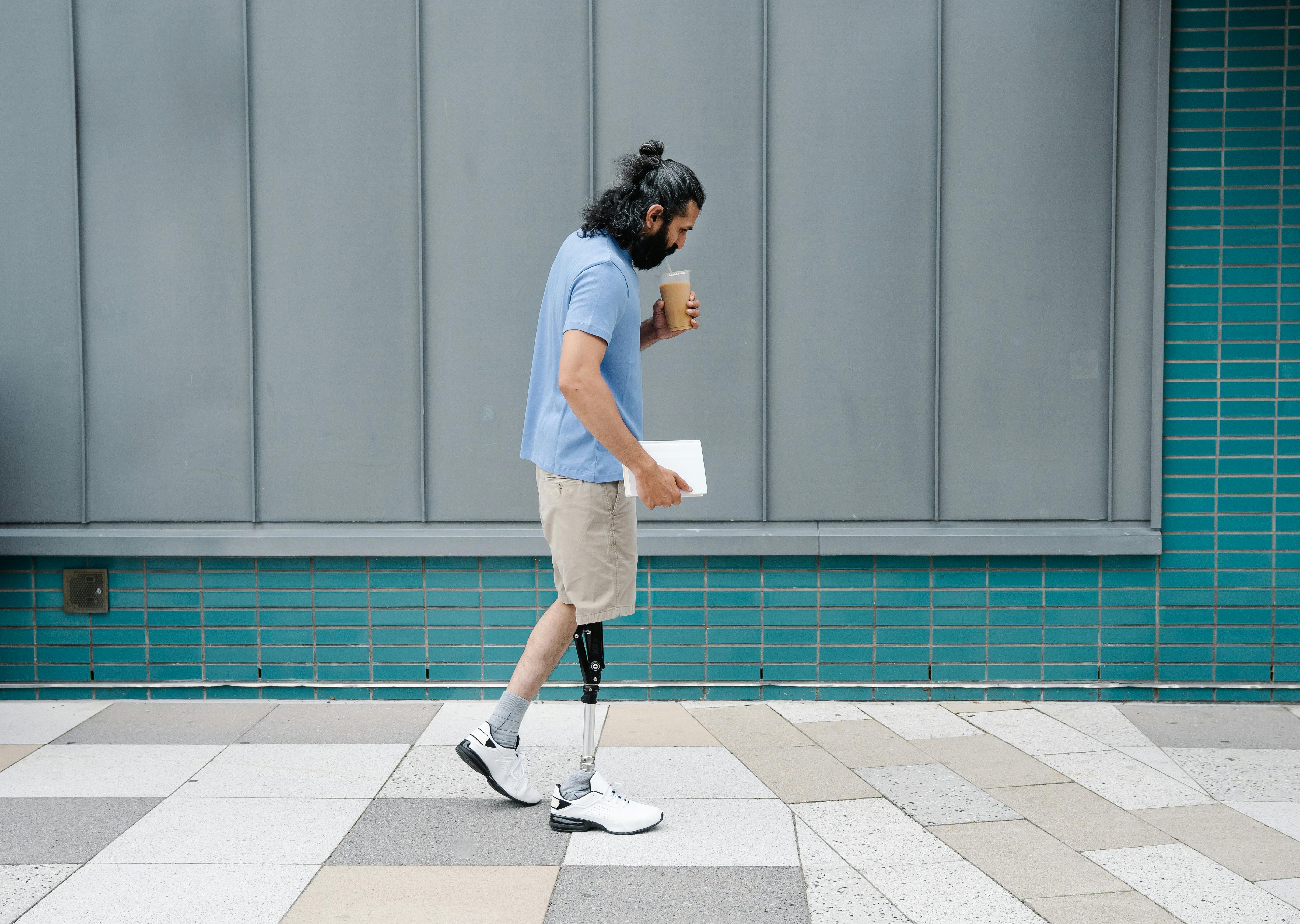 Man walking with a Prosthetic Leg · Free Stock Photo