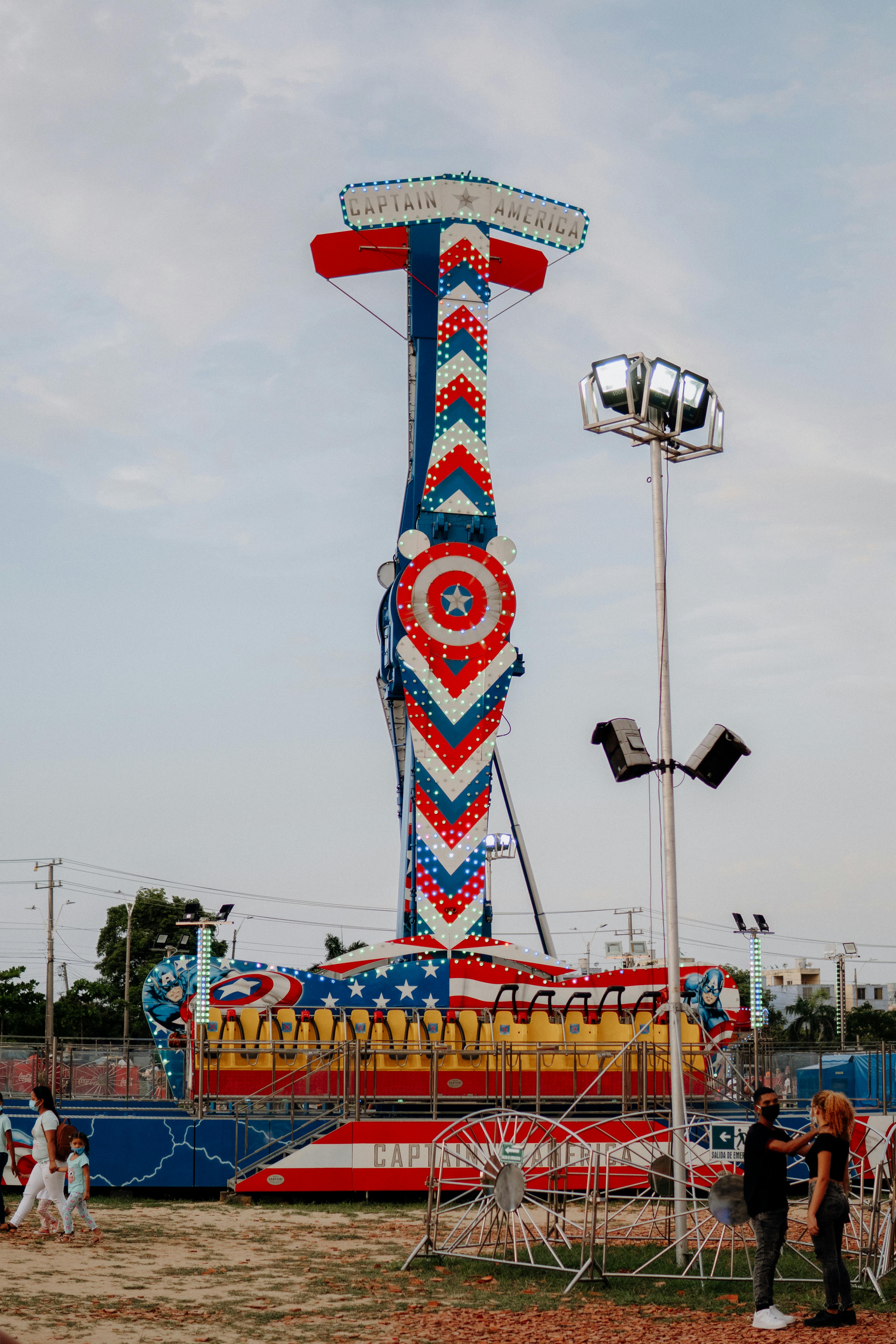 A Blue and White Amusement Ride · Free Stock Photo