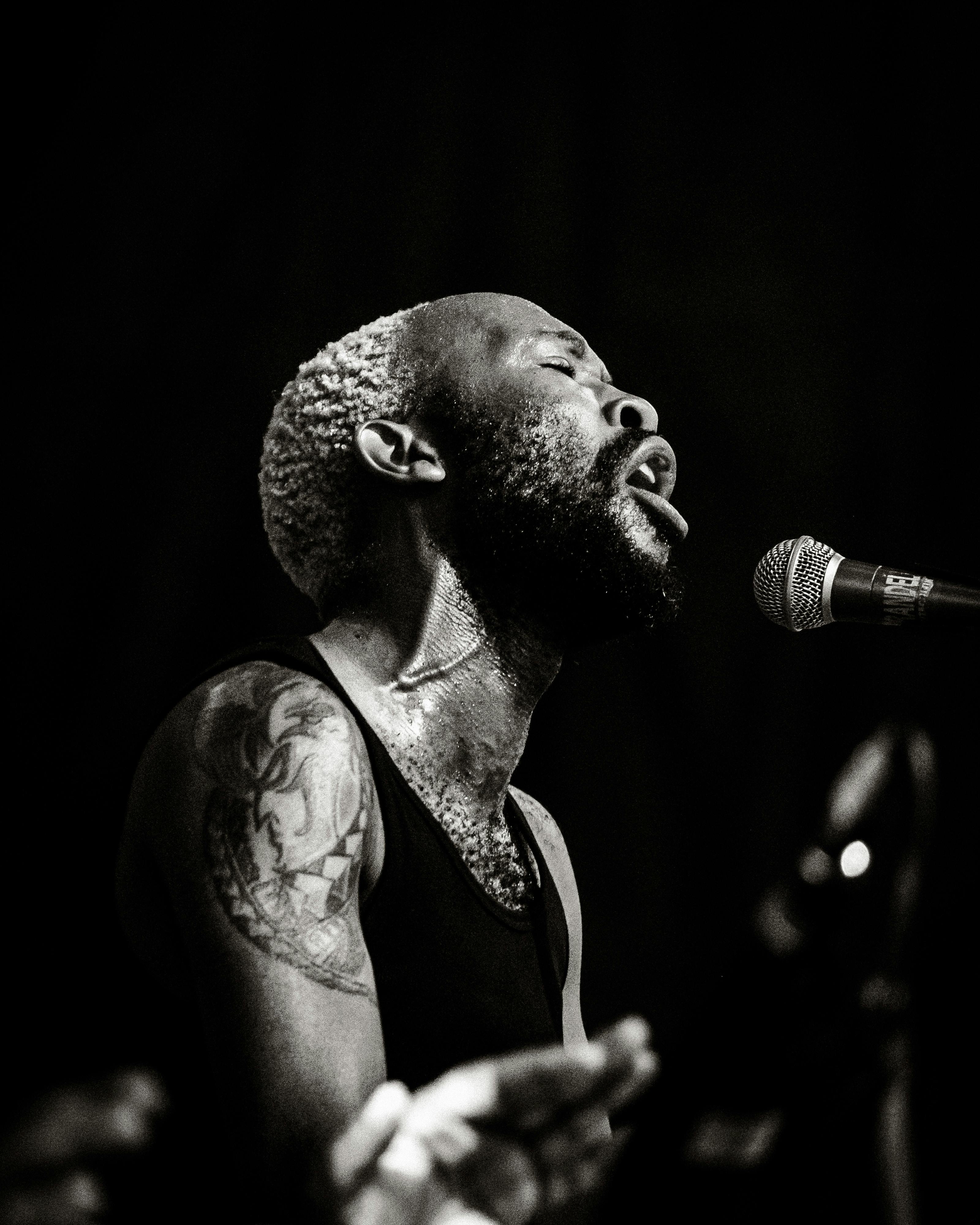 Man Holding Microphone · Free Stock Photo