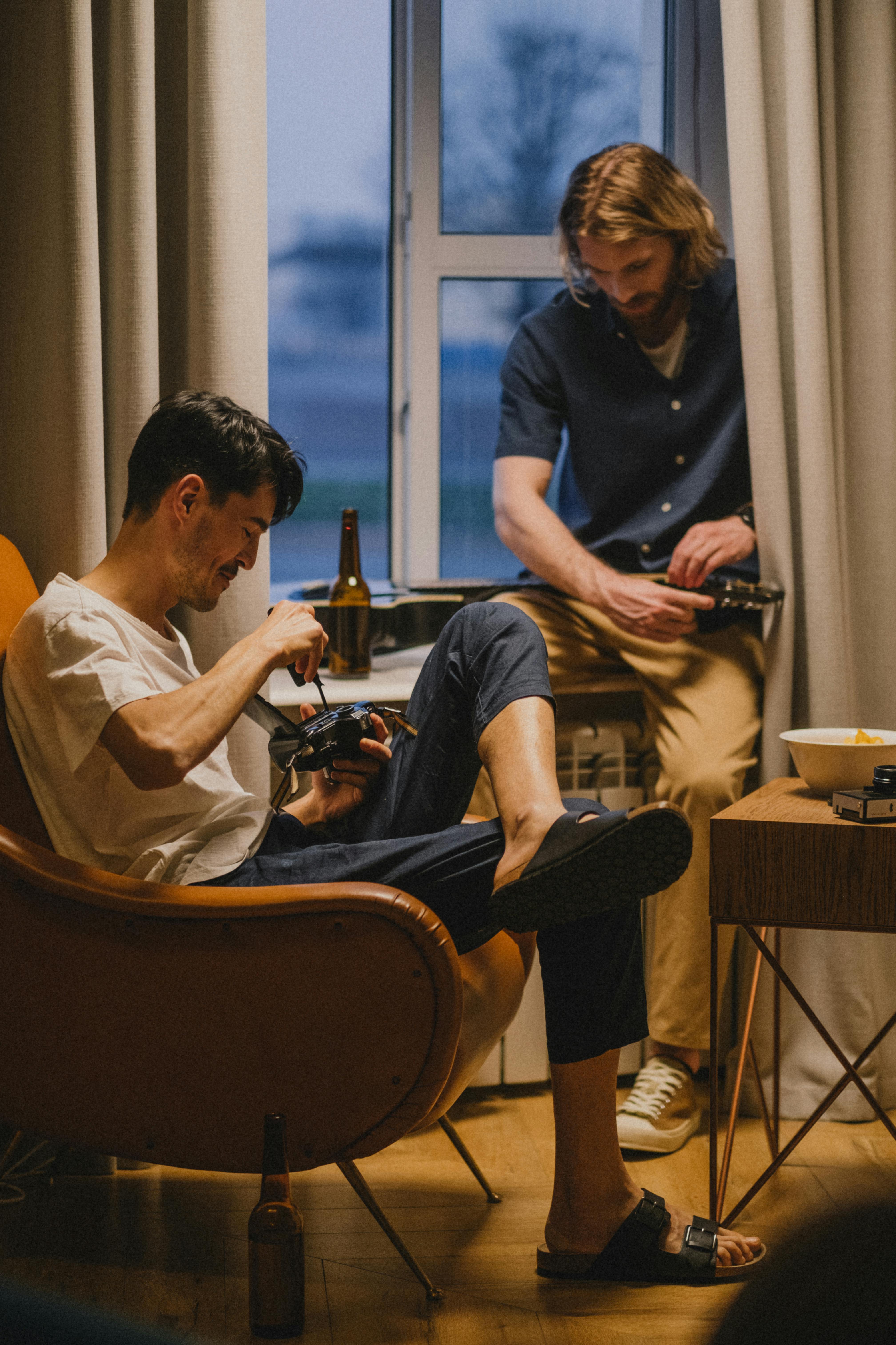Men Hanging Out in the Living Room · Free Stock Photo