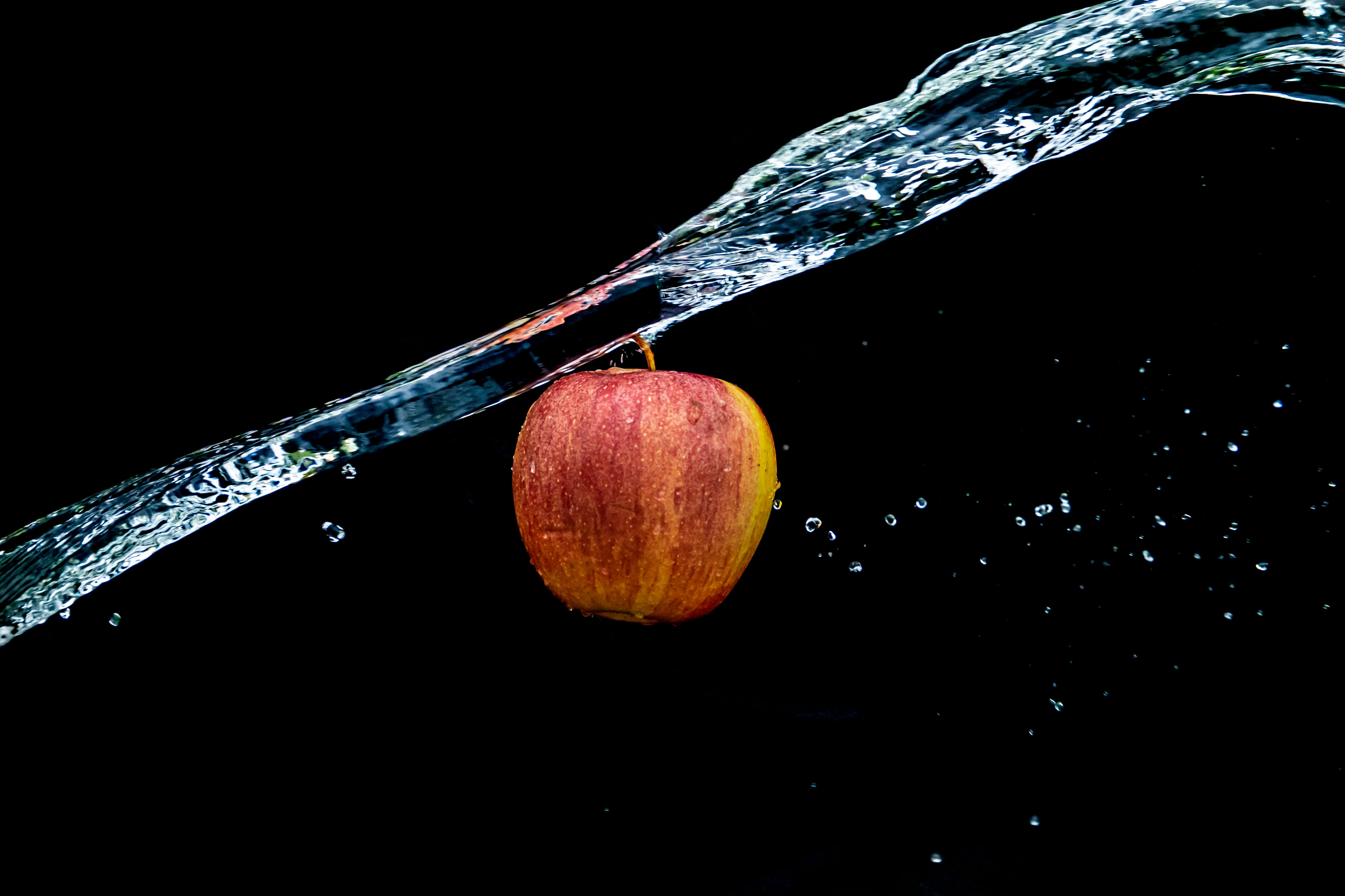An Apple Submerged in Water · Free Stock Photo