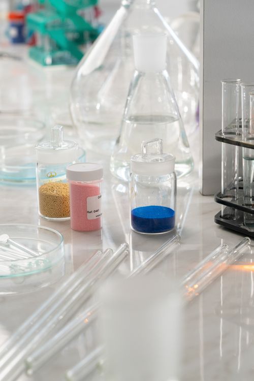Colored Powders in Glass Containers · Free Stock Photo