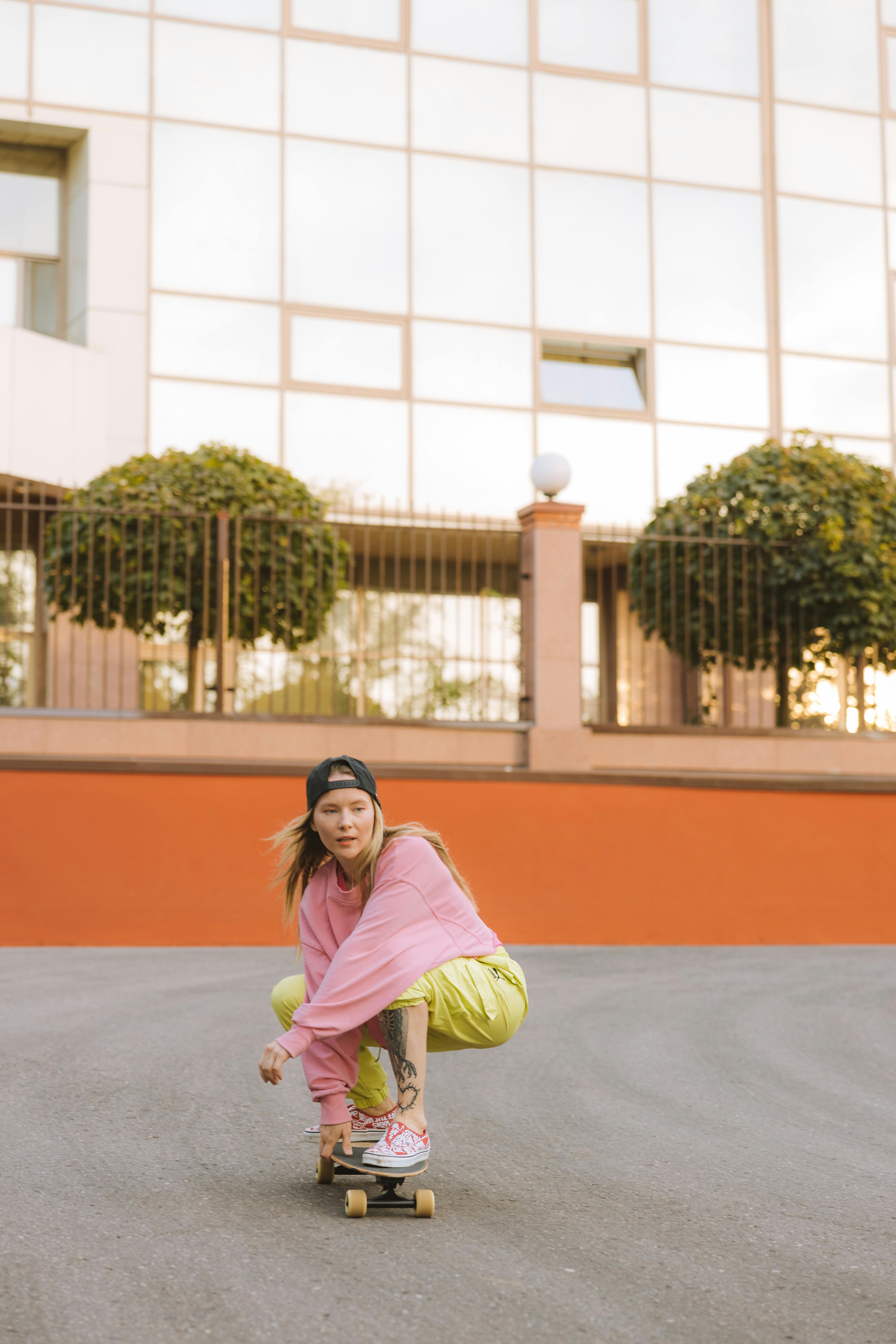 Photo of a Woman Longboarding · Free Stock Photo