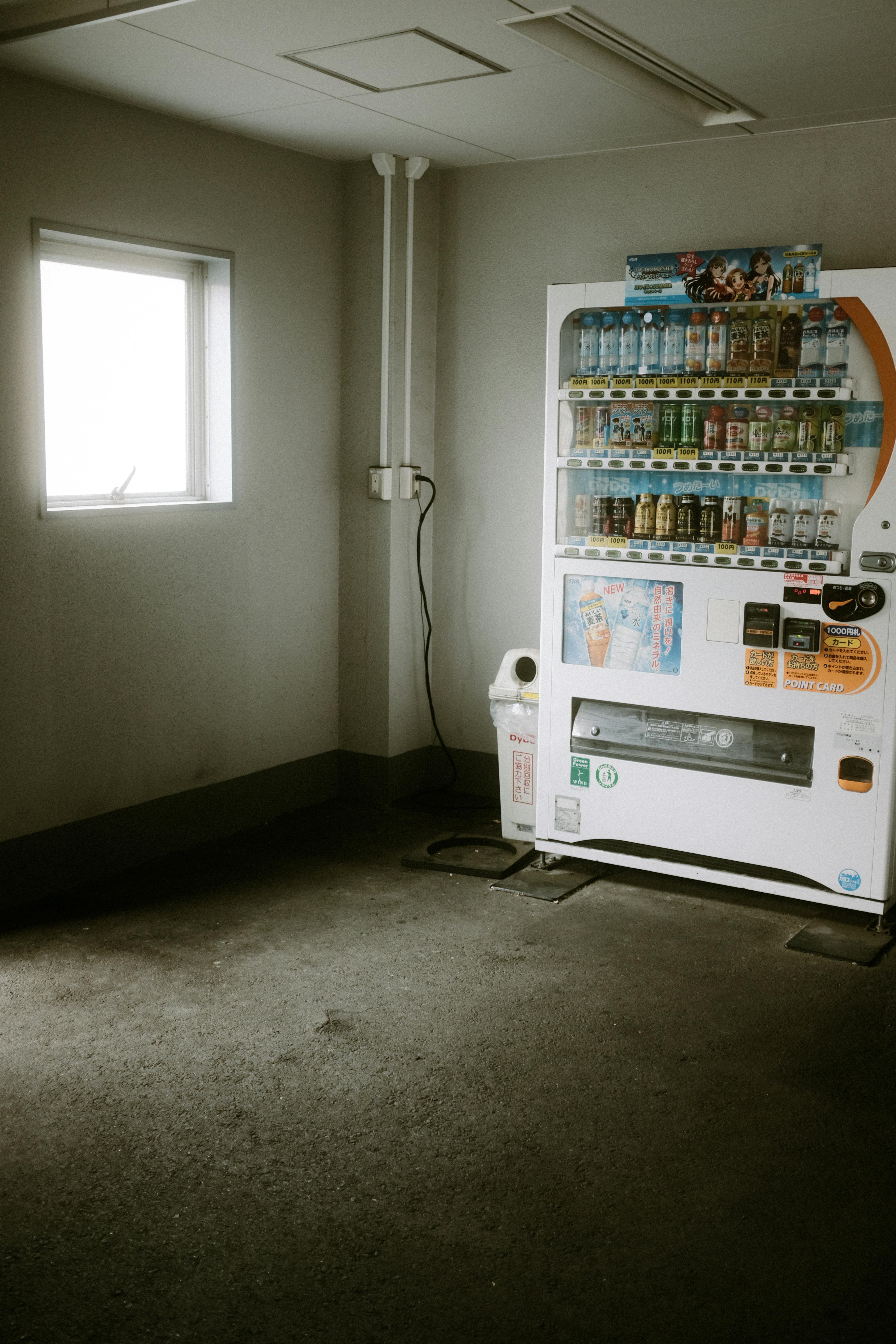 Photo of a Blue Vending Machine with Beverages · Free Stock Photo