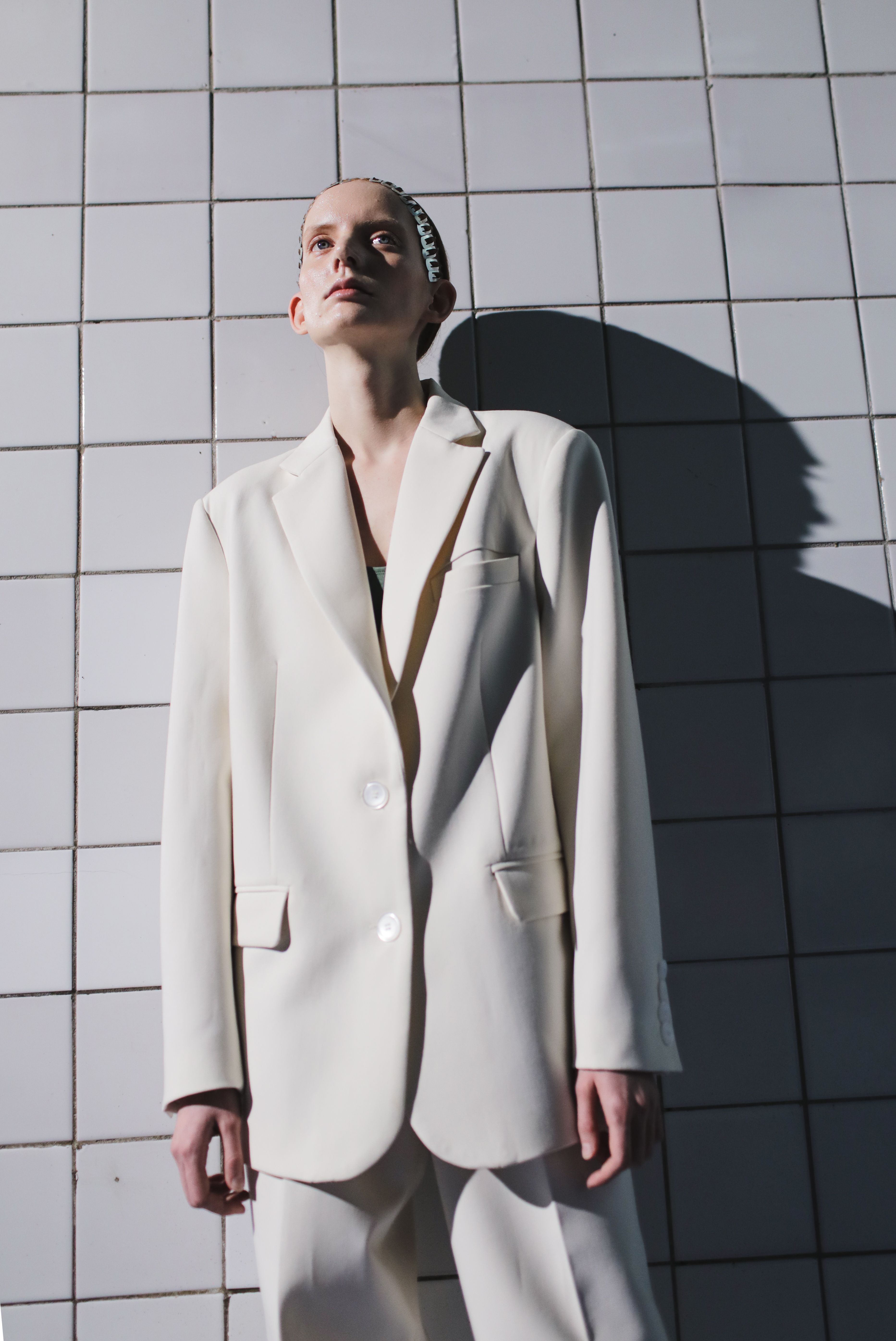Low-Angle Shot of a Woman in White Coat · Free Stock Photo